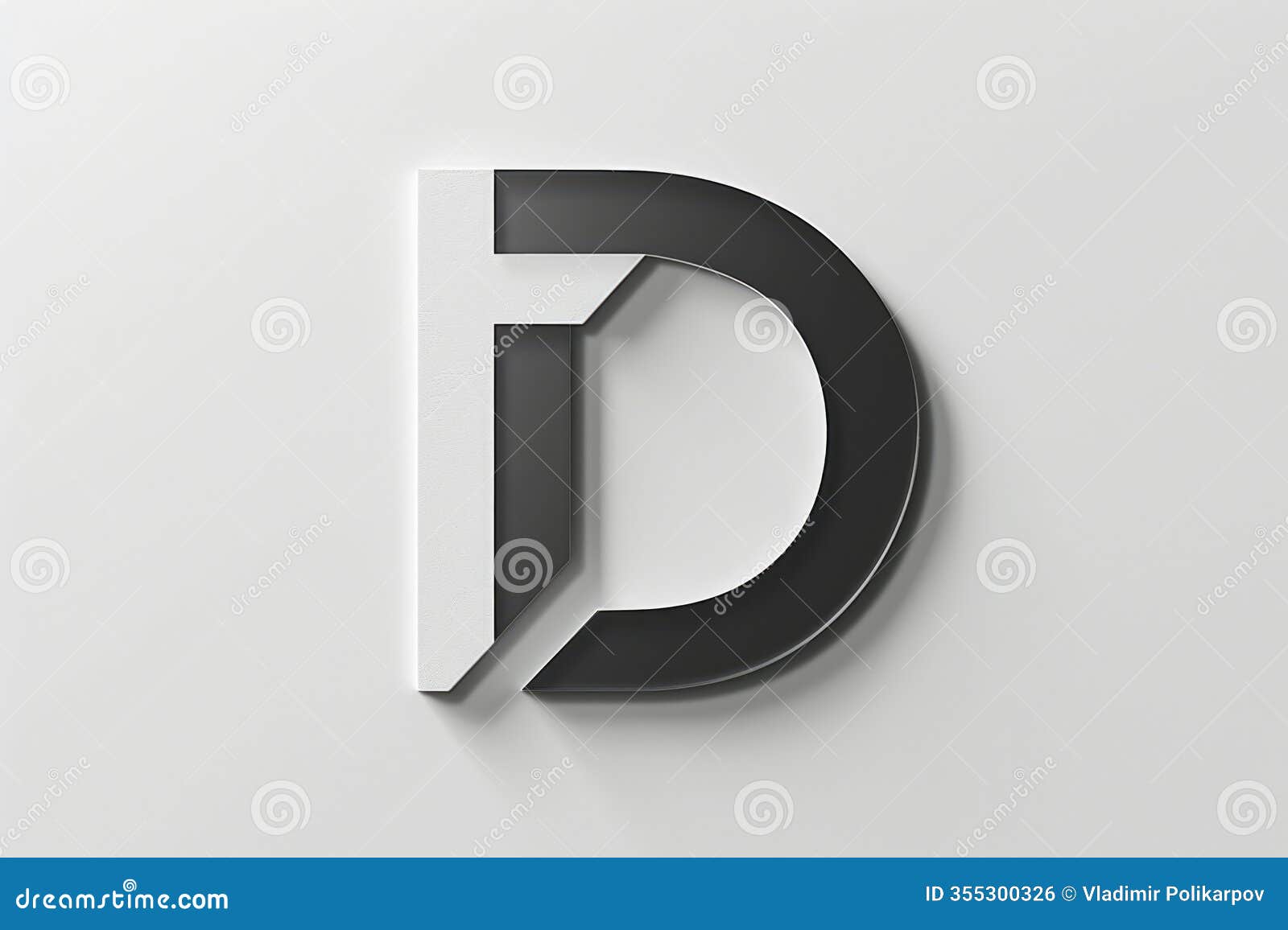A Single Letter D is Written in Black on a White Wall Stock Photo ...