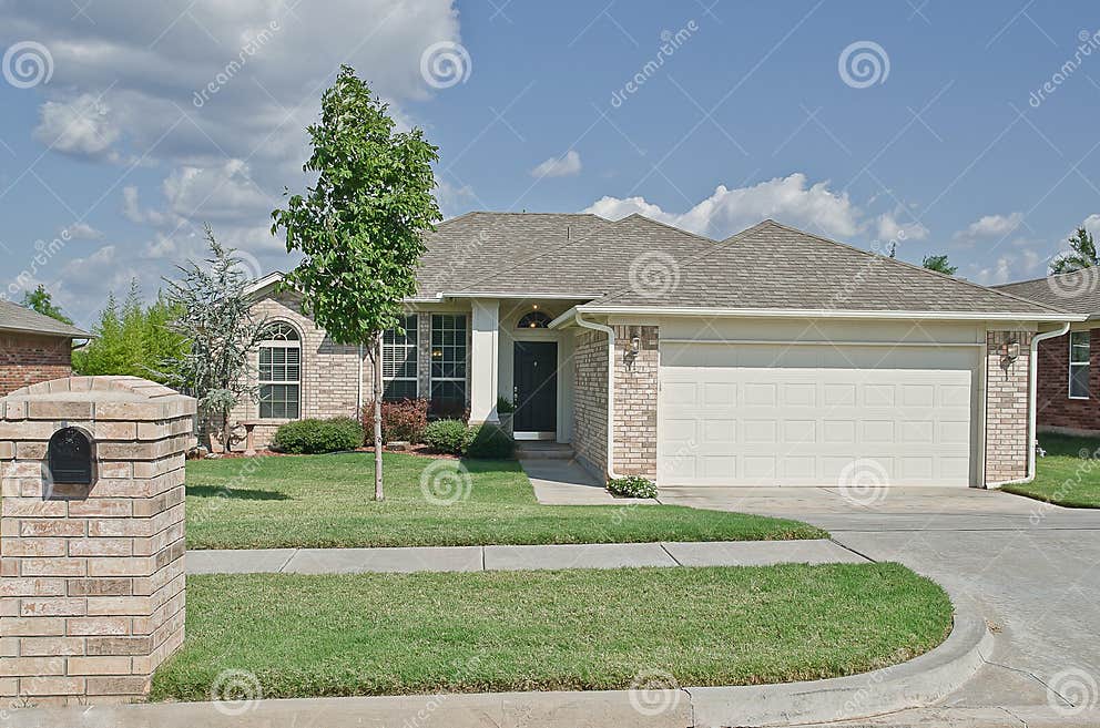 Single Level Brick Home stock image. Image of green, light - 65819527