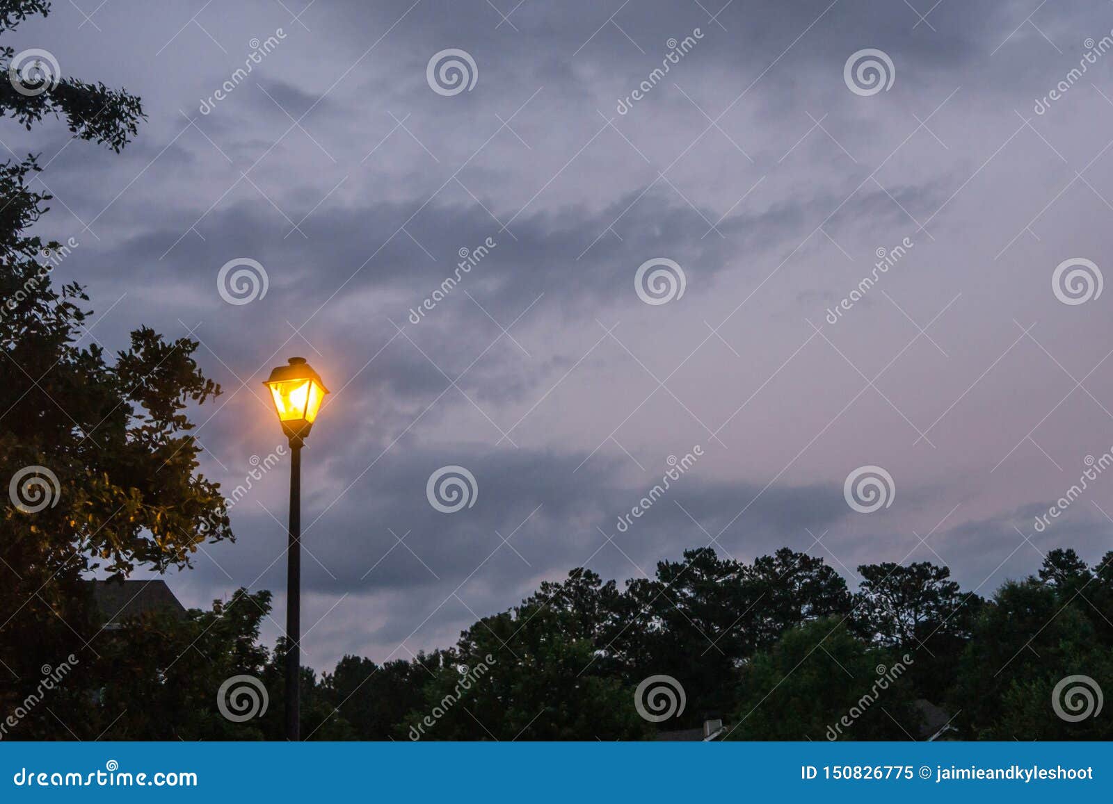 Single Lone Street Light Lamp Post at Night Shining in the Dark in the ...