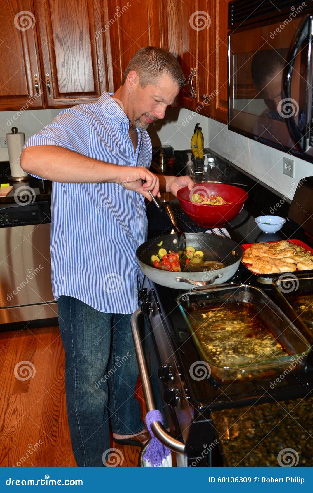 Single man cooking editorial stock image. Image of single - 60106309
