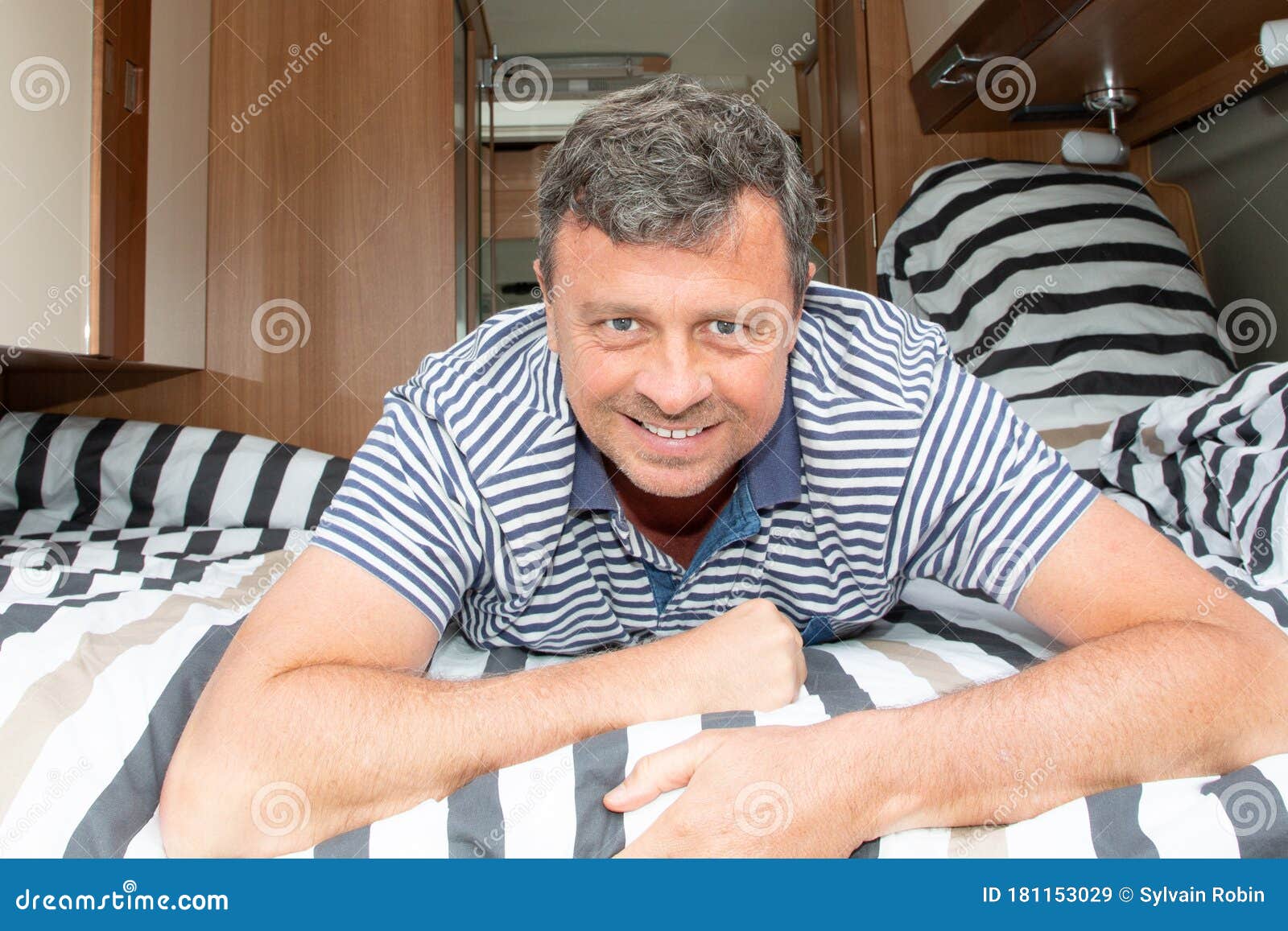 Single Man Lying in Campervan Bed in MotorHome during Vacation in RV ...