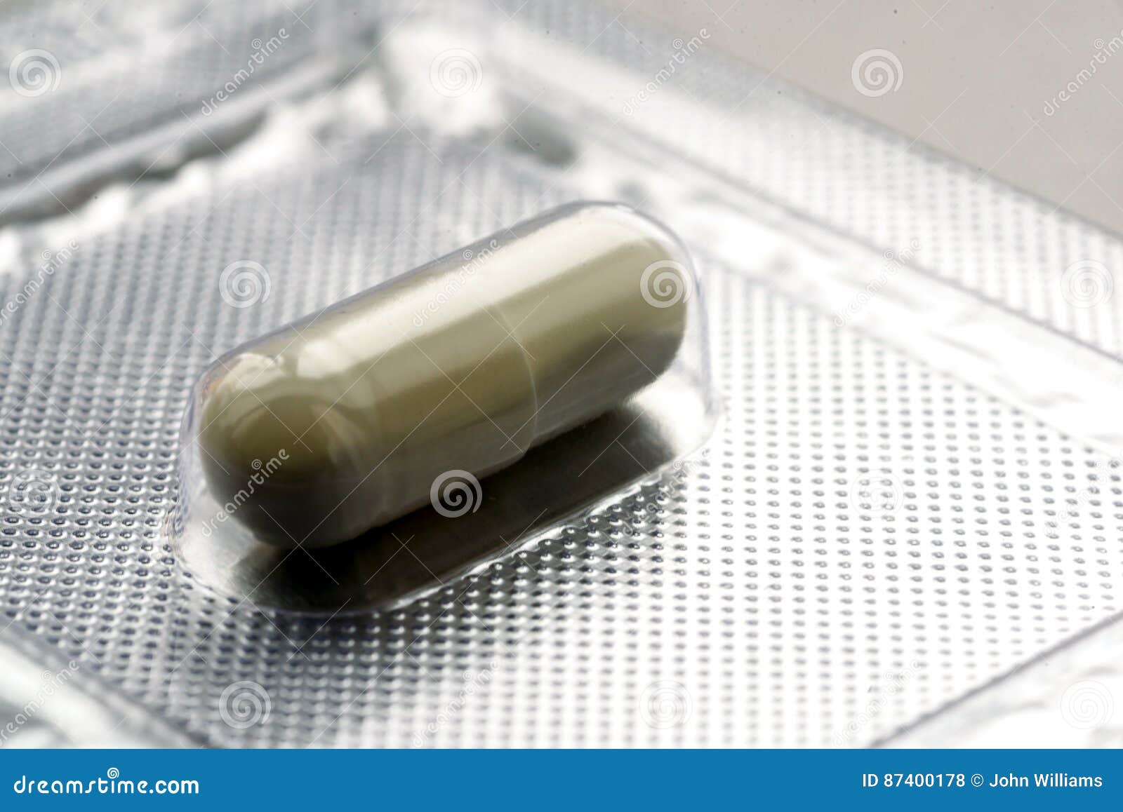 Single Medical Pill in Foil Wrapping Stock Photo - Image of addiction ...