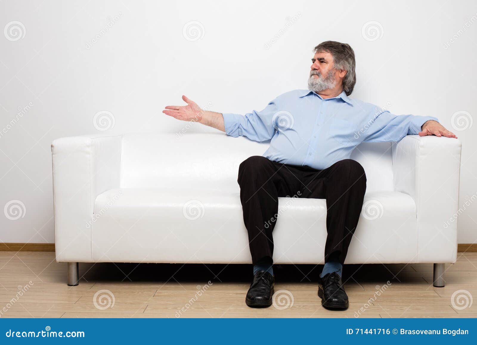 Single Old Men on White Couch Stock Photo - Image of looking, music ...