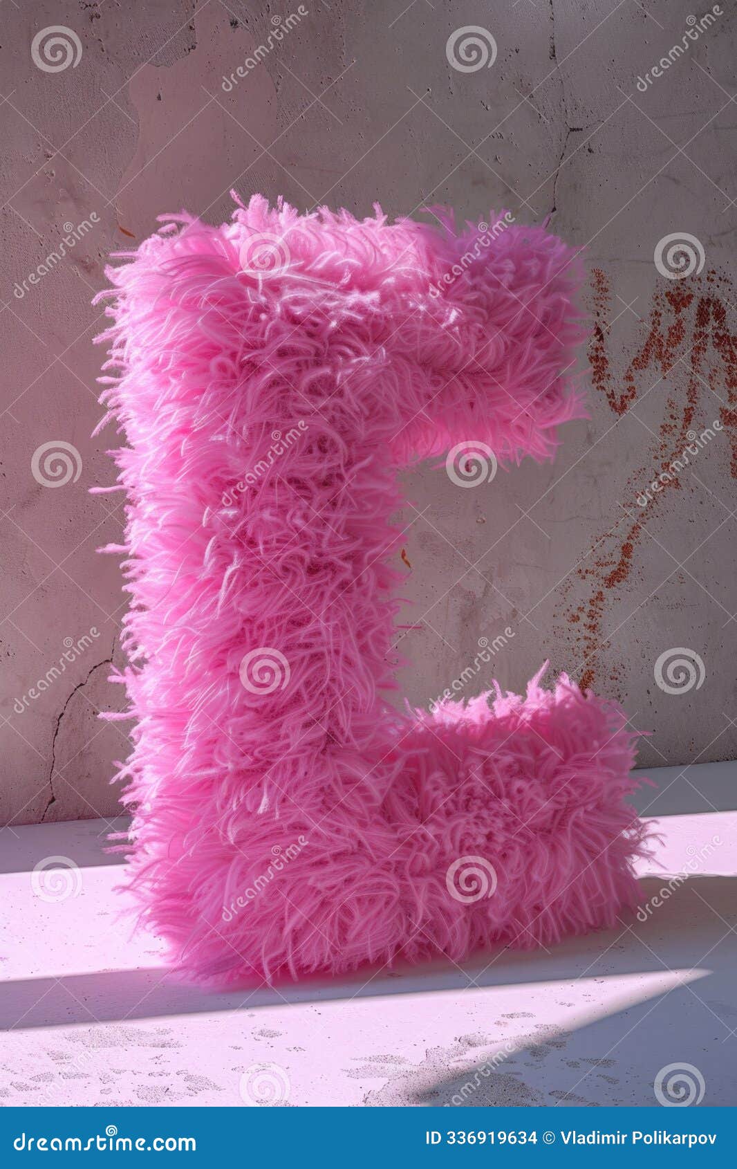A Single Pink Fuzzy Letter E on a White Background, Suitable for Use in ...