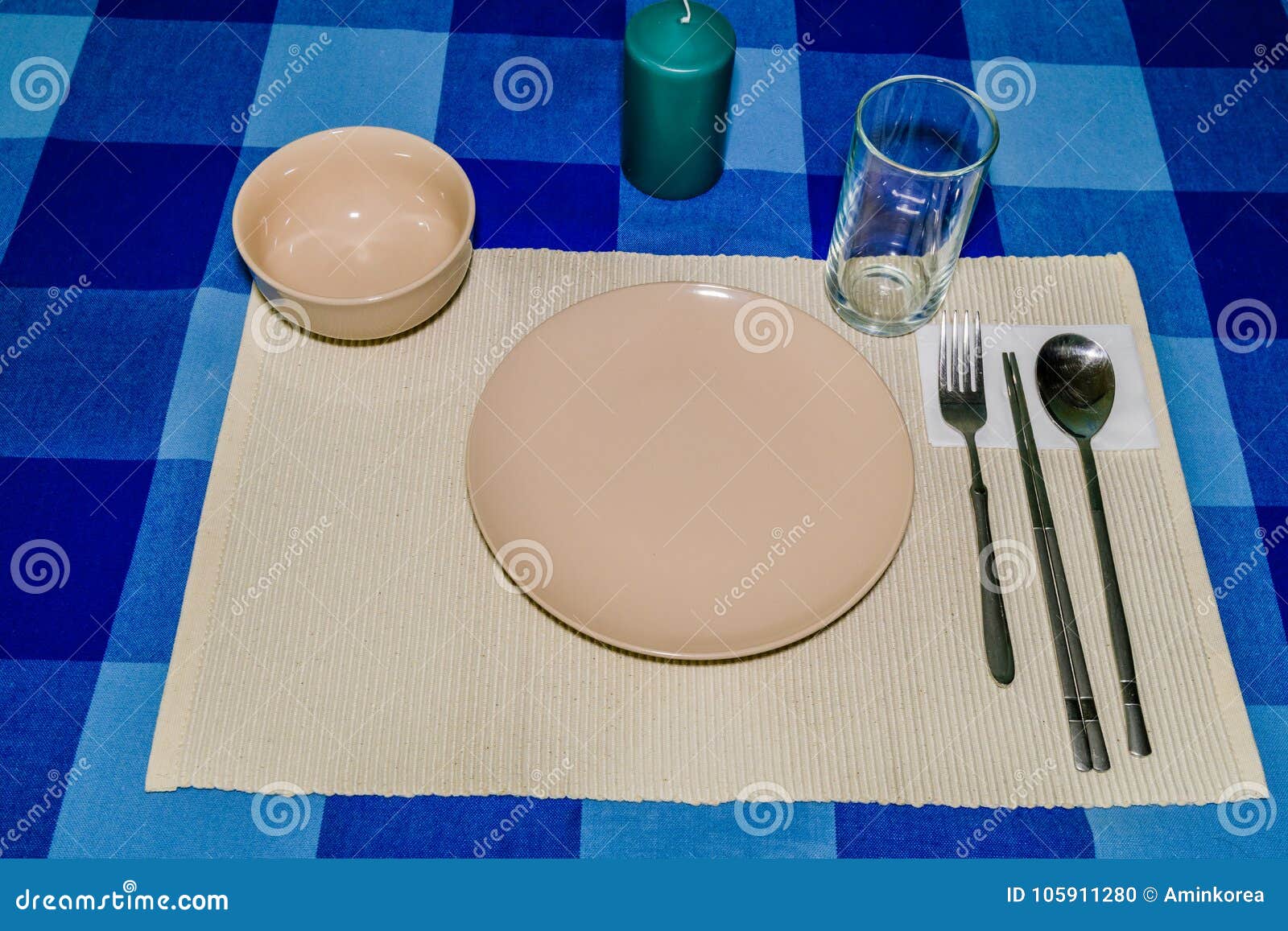 Single Place Setting on Blue Checked Table Cloth Stock Photo - Image of ...