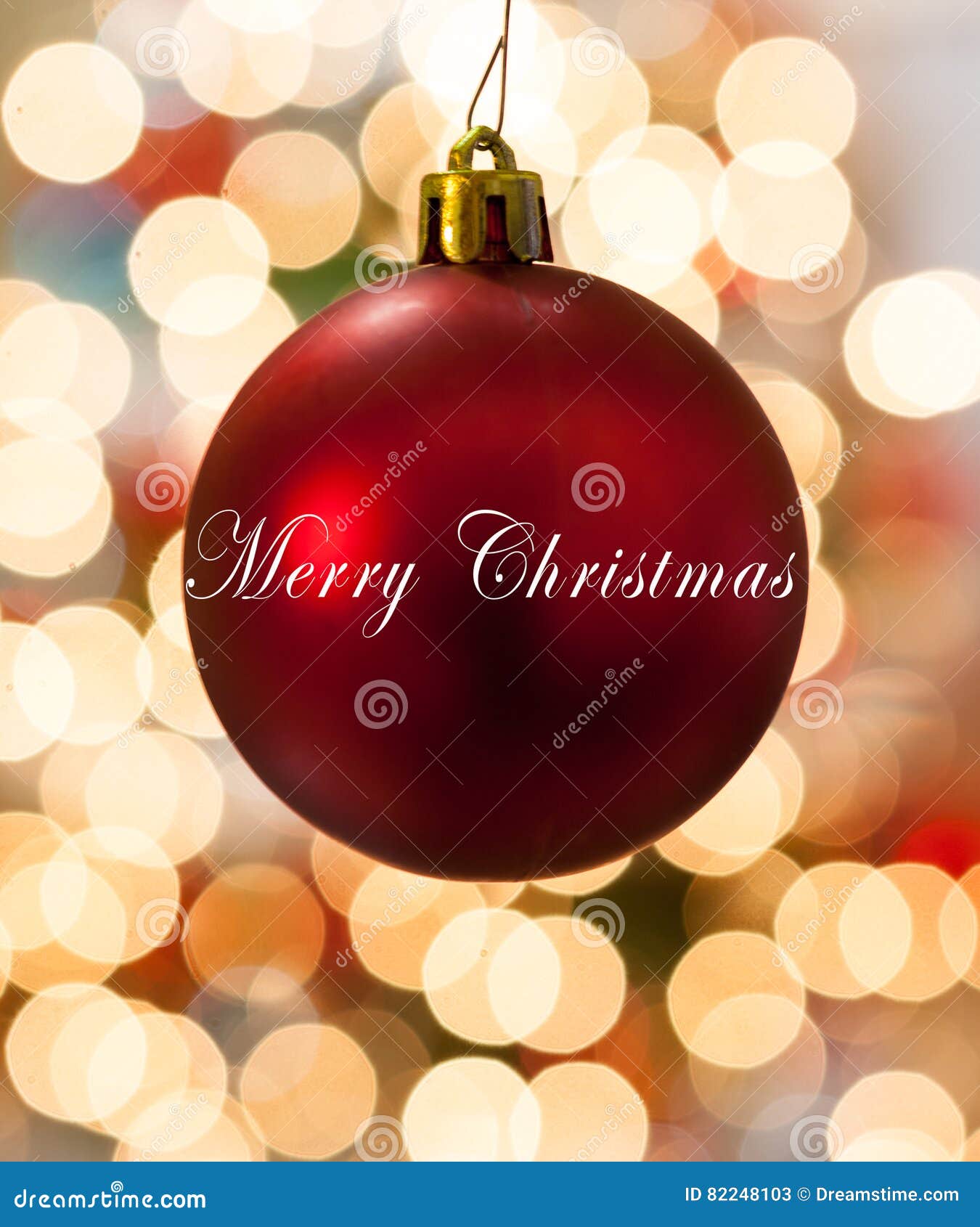 Single Red Christmas Ornament Hanging in Front of Lights Stock Image ...