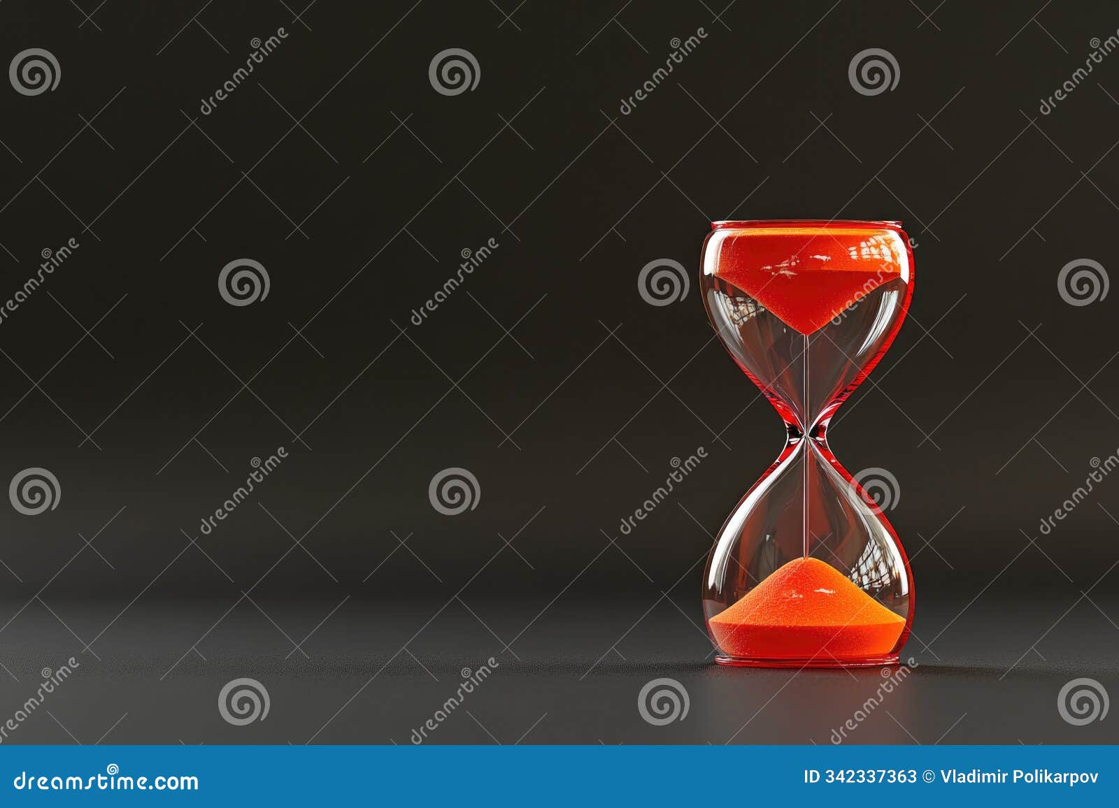 A Single Red Hourglass Sits on Top of a Table, Ready To Measure Time ...