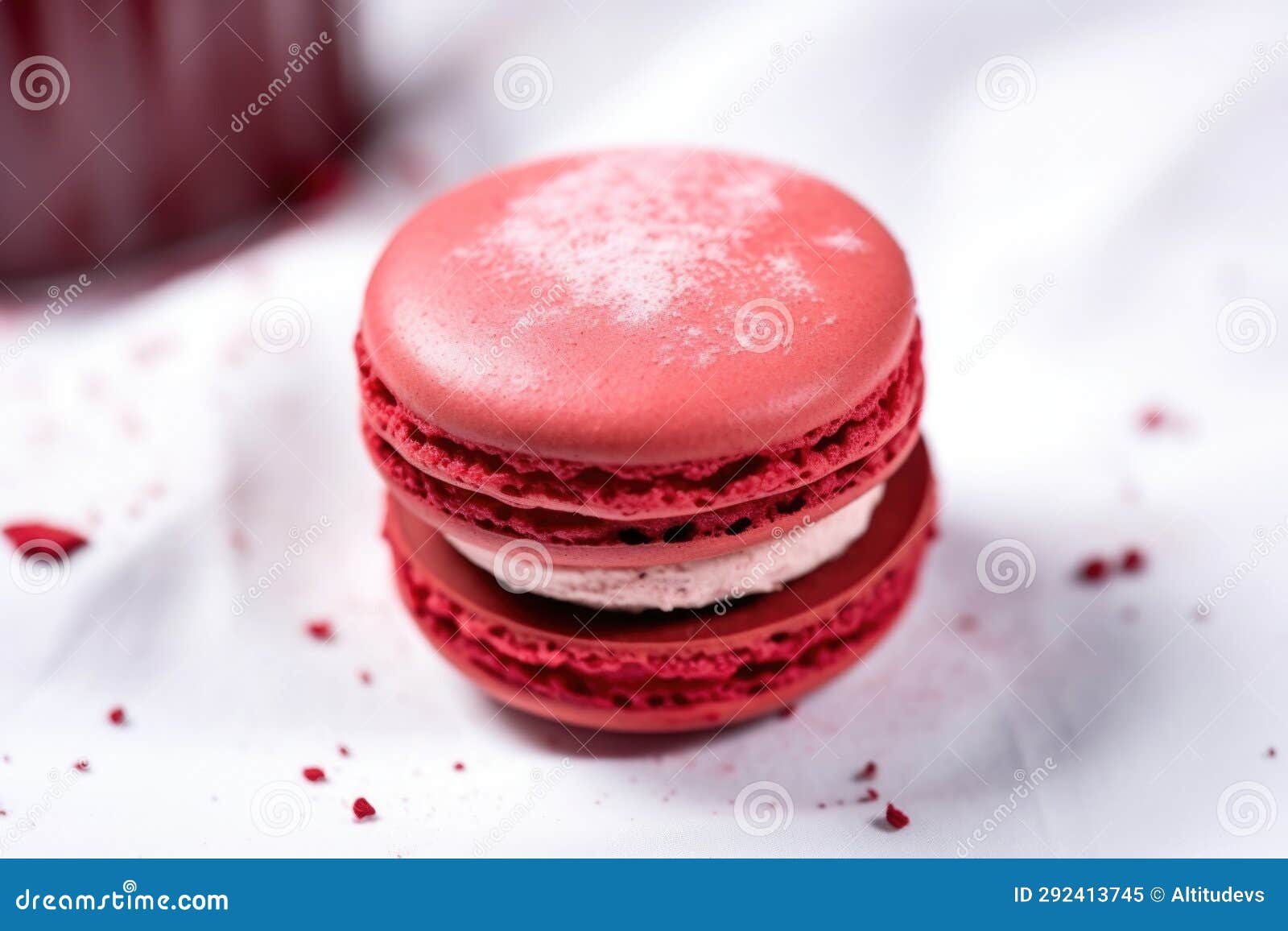 A Single Red Velvet Macaron Under Soft Light Stock Image - Image of ...