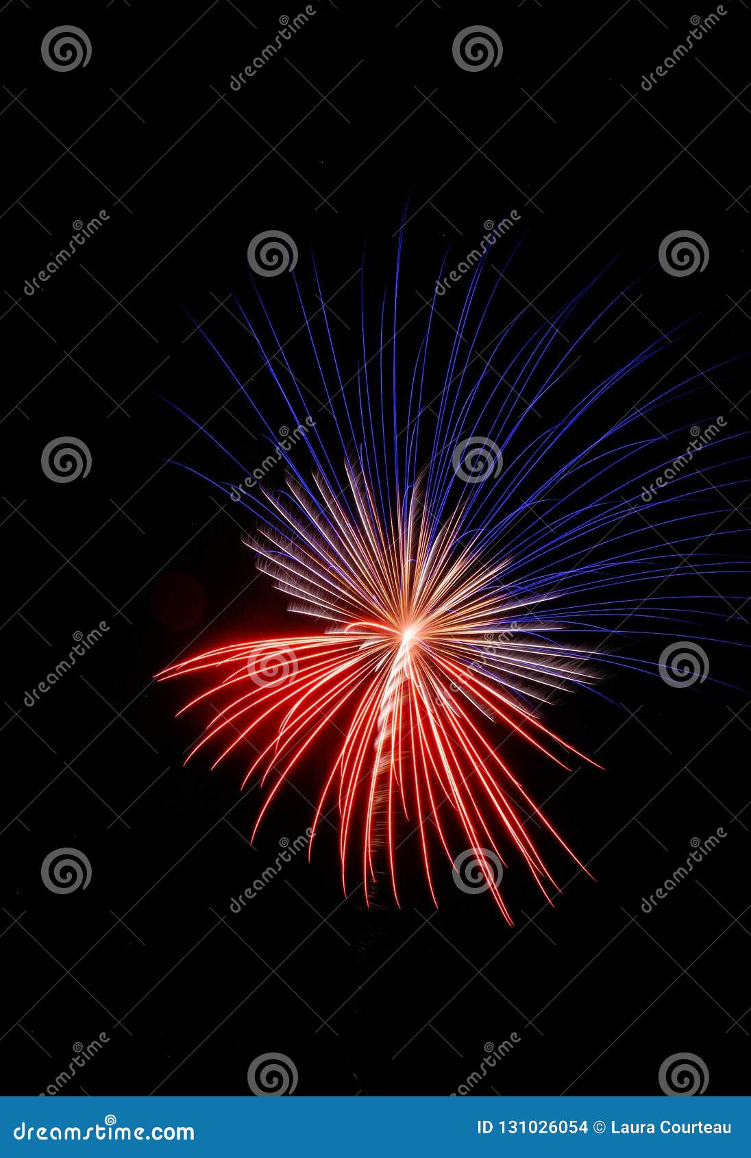 Single Red, White, and Blue Firework Against a Black Sky Stock Photo ...