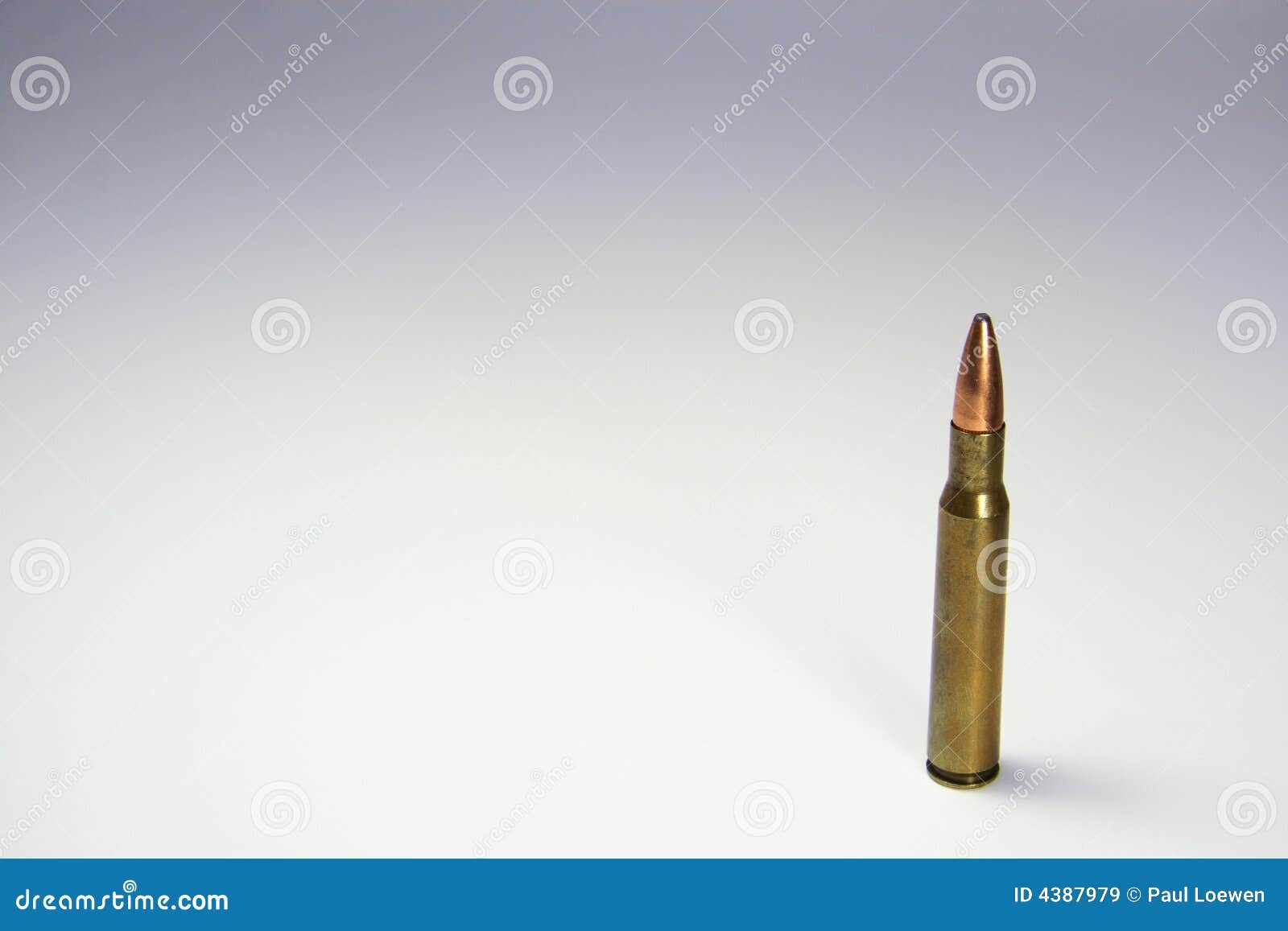 Single Rifle Bullet stock image. Image of brass, white - 4387979
