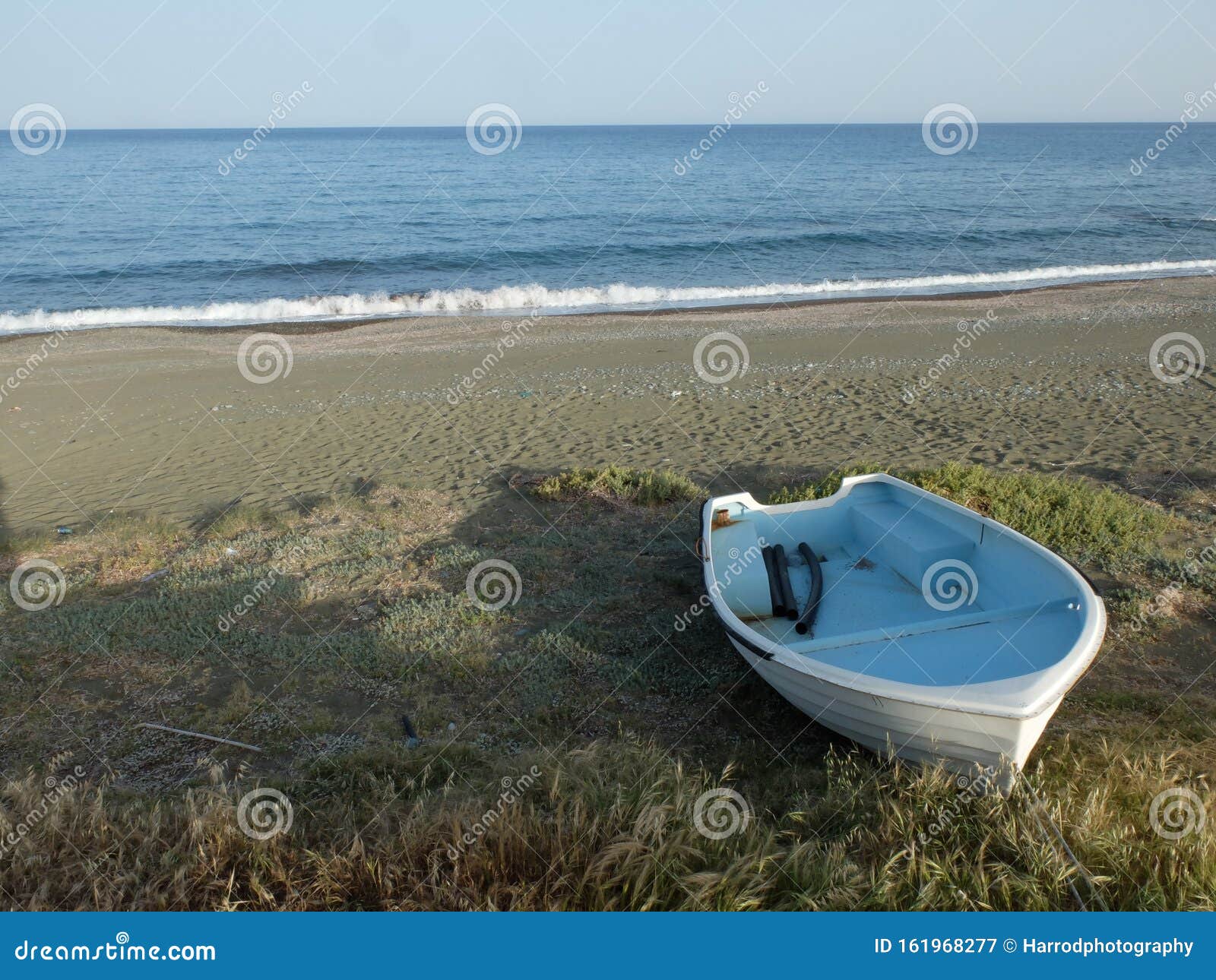 Single Rowboat on the Beach Stock Image - Image of landscape, ocean ...