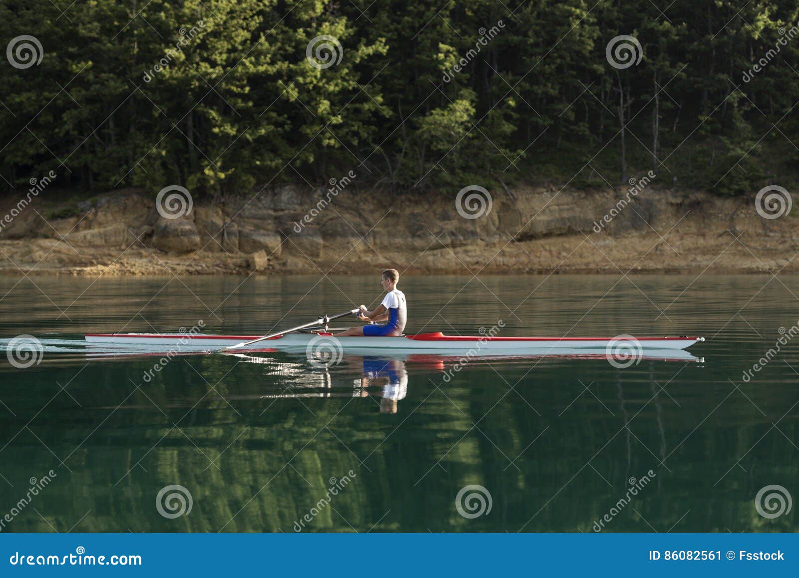 Single rower at sunrise stock image. Image of oars, racing - 86082561