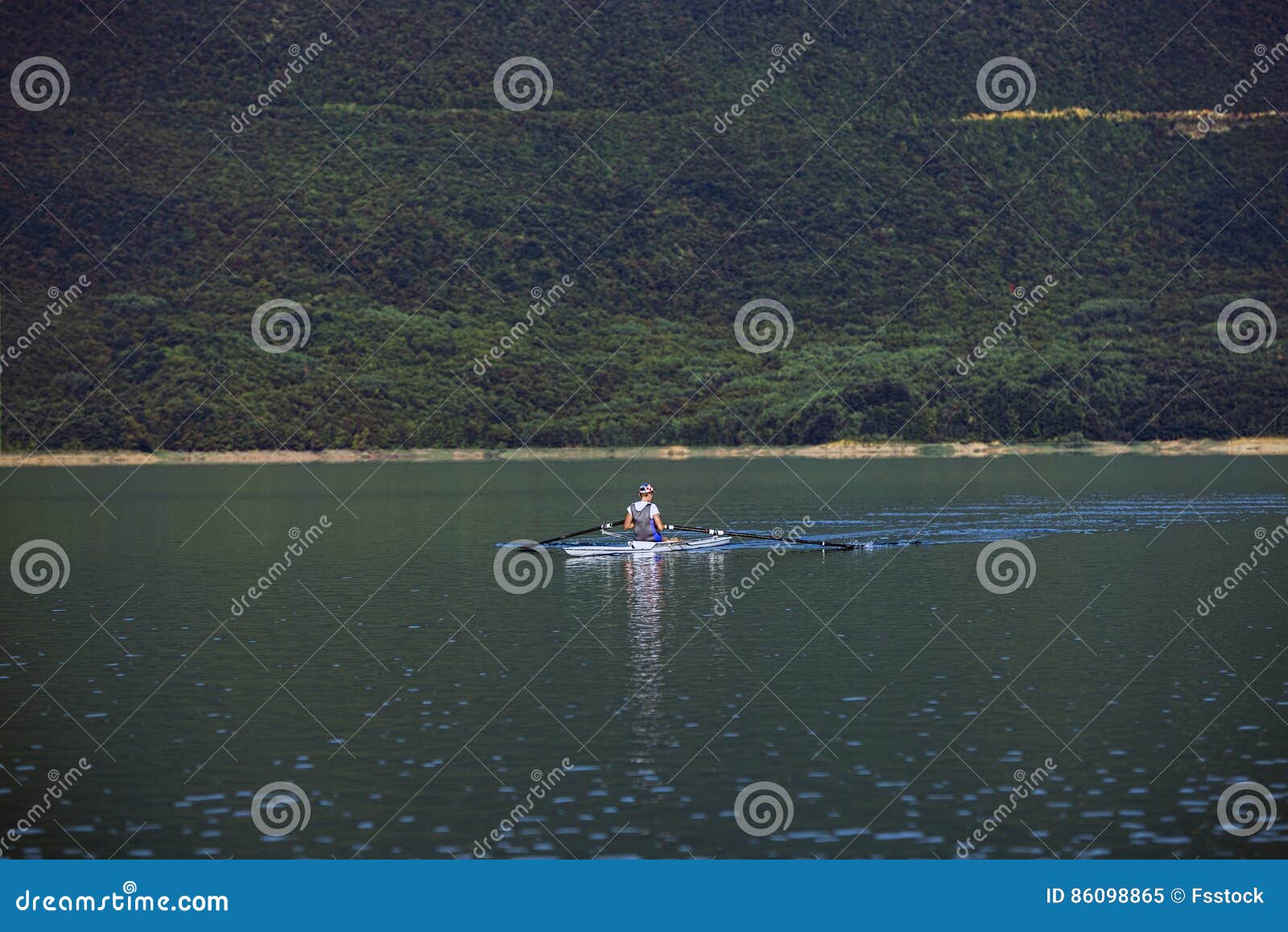 Single rower at sunrise stock image. Image of enjoyment - 86098865