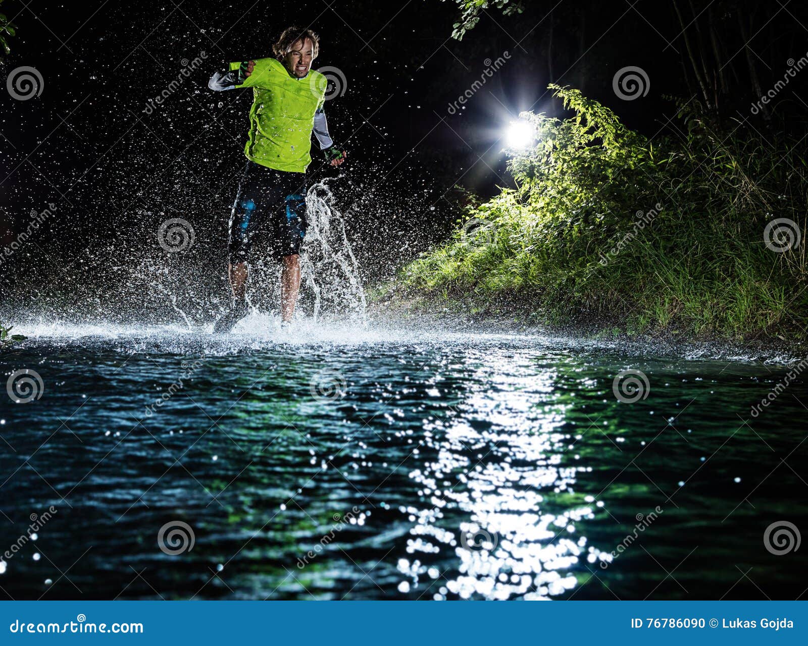 Single Runner Running, Making Splash in a Stream. Stock Photo - Image ...