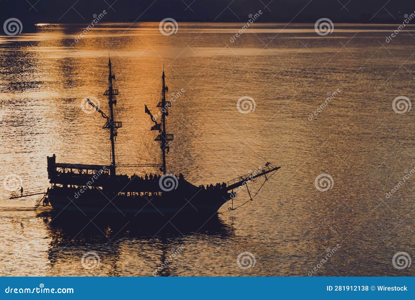 Single Ship Silhouetted Against a Beautiful Sunset Sky on the Open ...