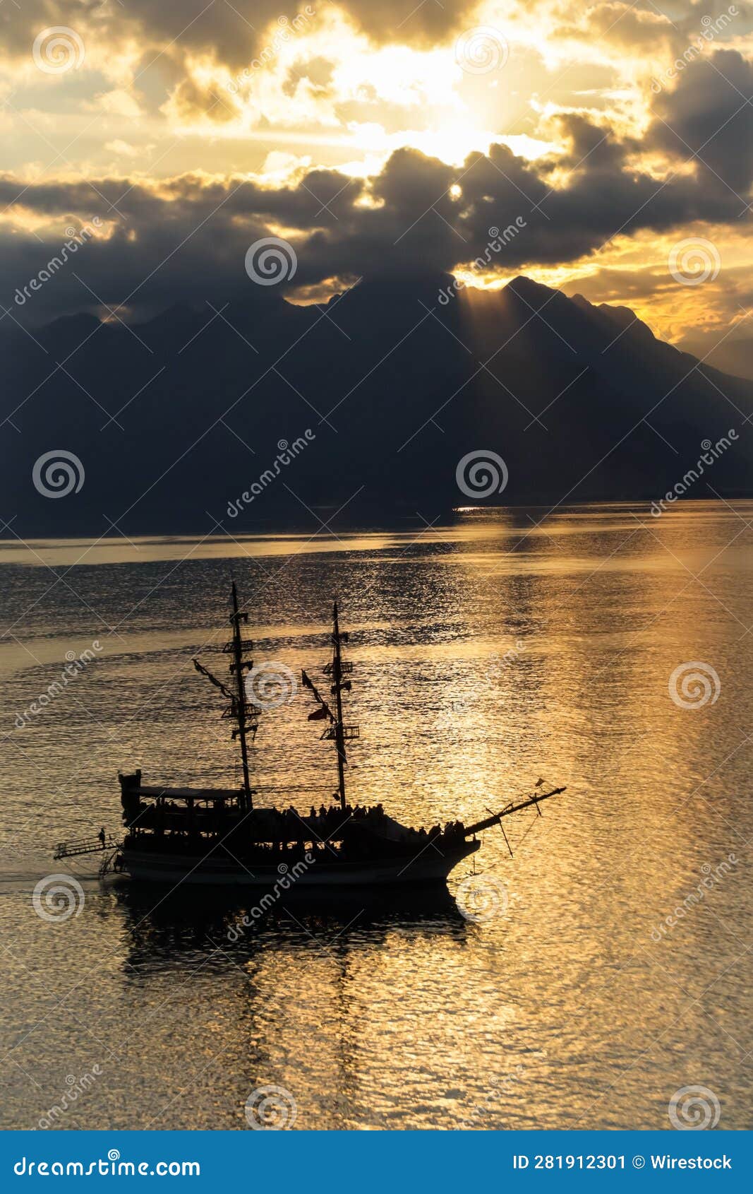 Single Ship Silhouetted Against a Beautiful Sunset Sky on the Open ...