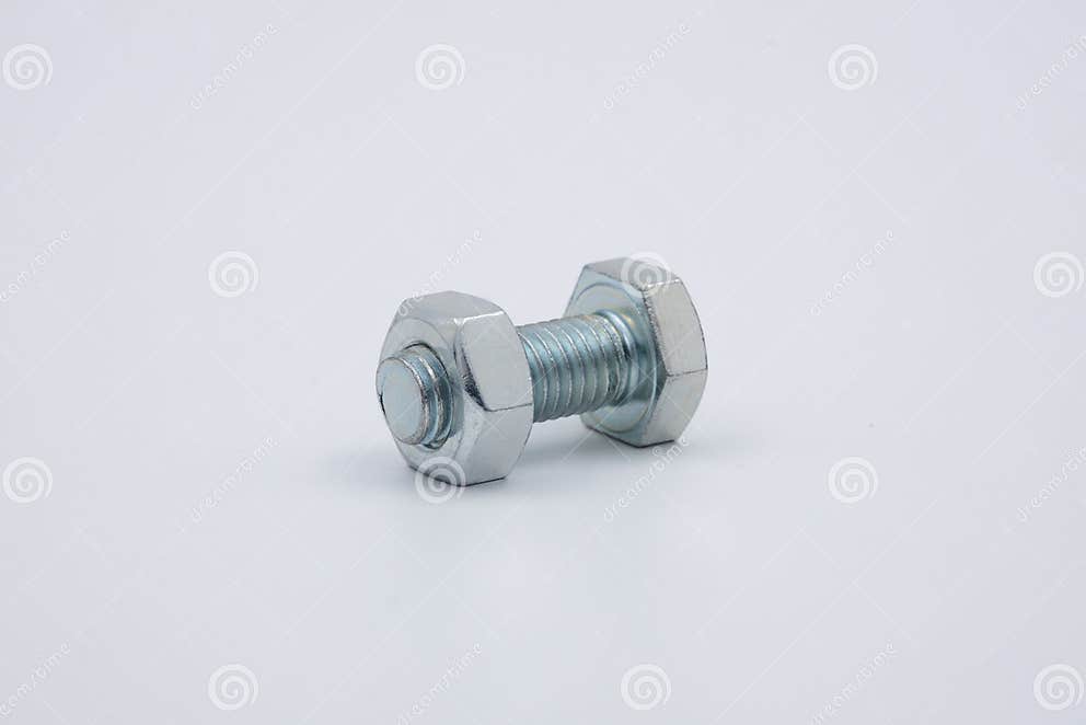A Single Short Bolt with a Nut Attached Stock Image - Image of ...