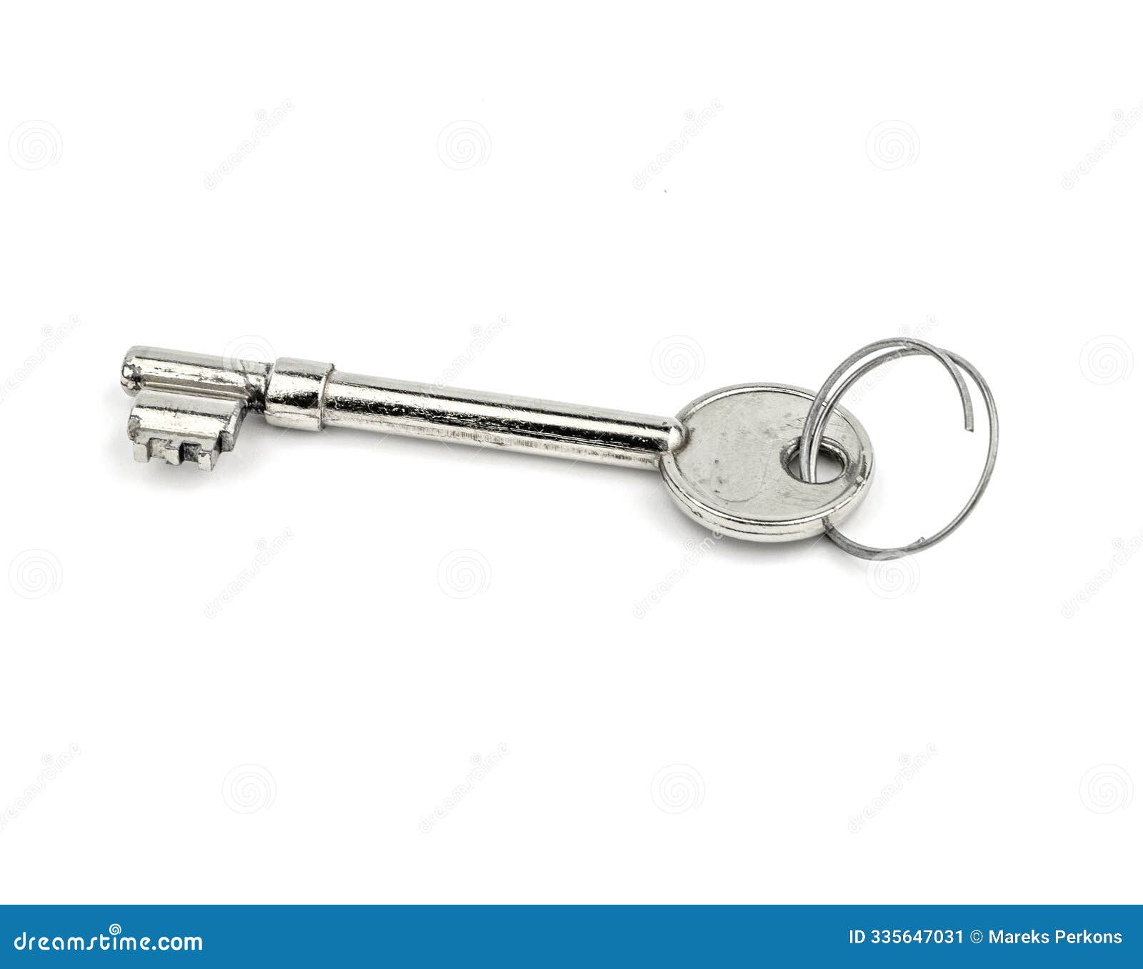 A Single Silver Colored Key with a Round Head and a Key Ring Attached ...