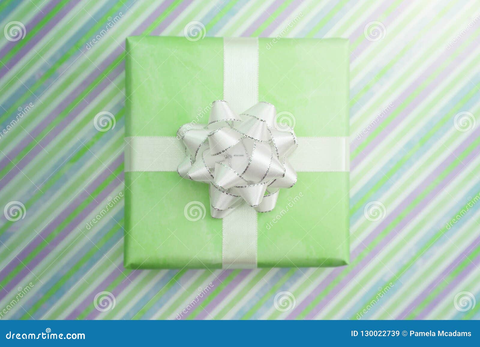 Single Simple Wrapped Present on a Matching Background Stock Image ...