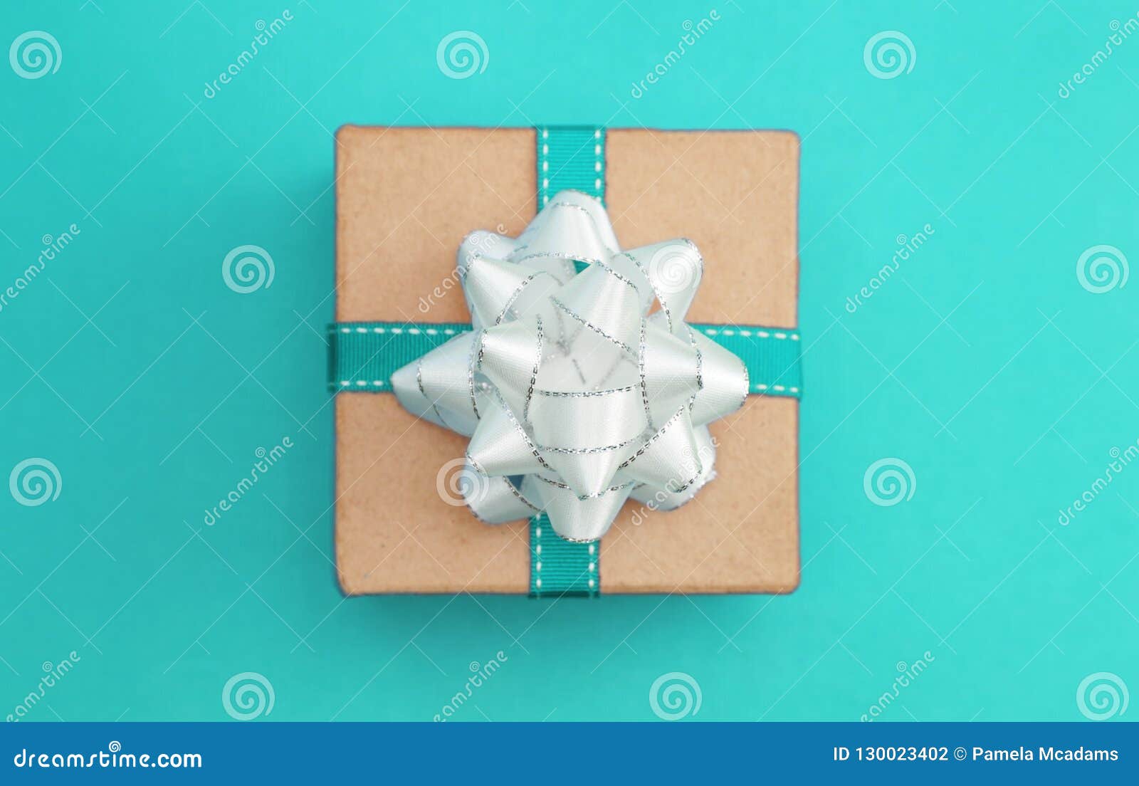 Single Simple Wrapped Present on a Matching Background Stock Photo ...