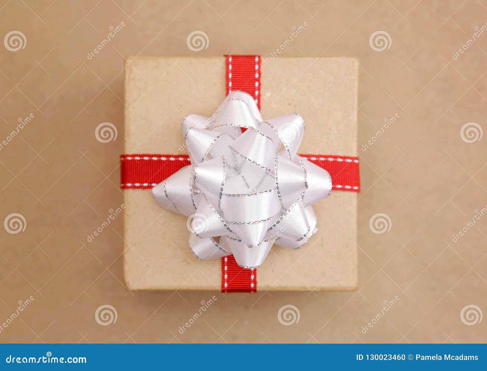Single Simple Wrapped Present on a Matching Background Stock Photo ...