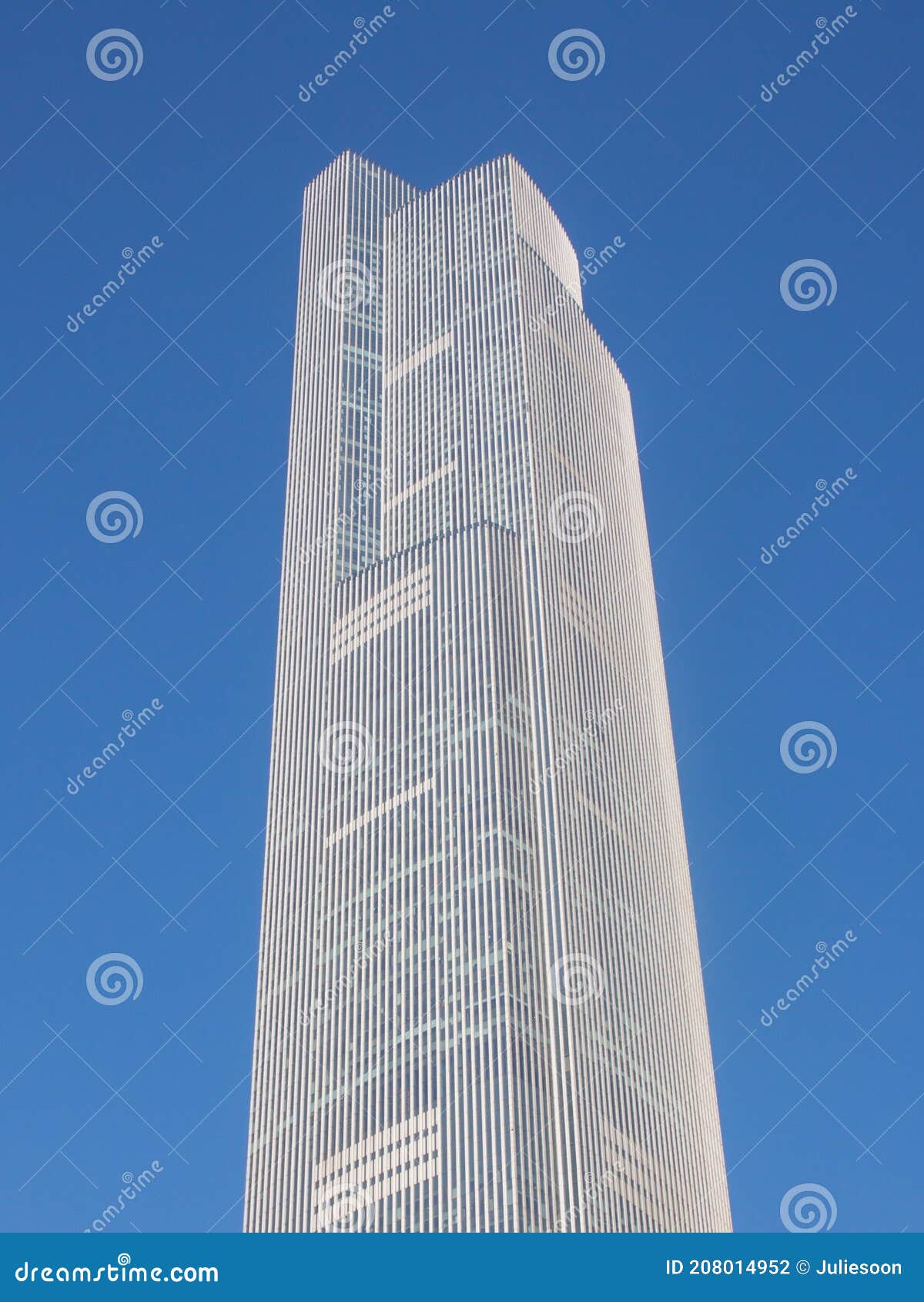 Single Skyscraper on a Background of a Blue Sky Stock Photo - Image of ...