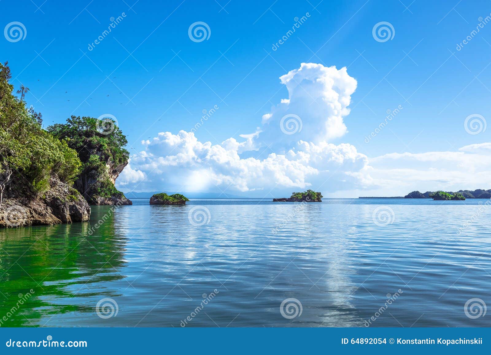 Single Small Key in the Middle of Sea Stock Photo - Image of solitary ...