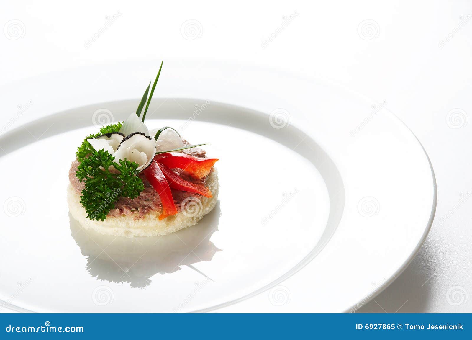 Single snack on white dish stock image. Image of catering - 6927865