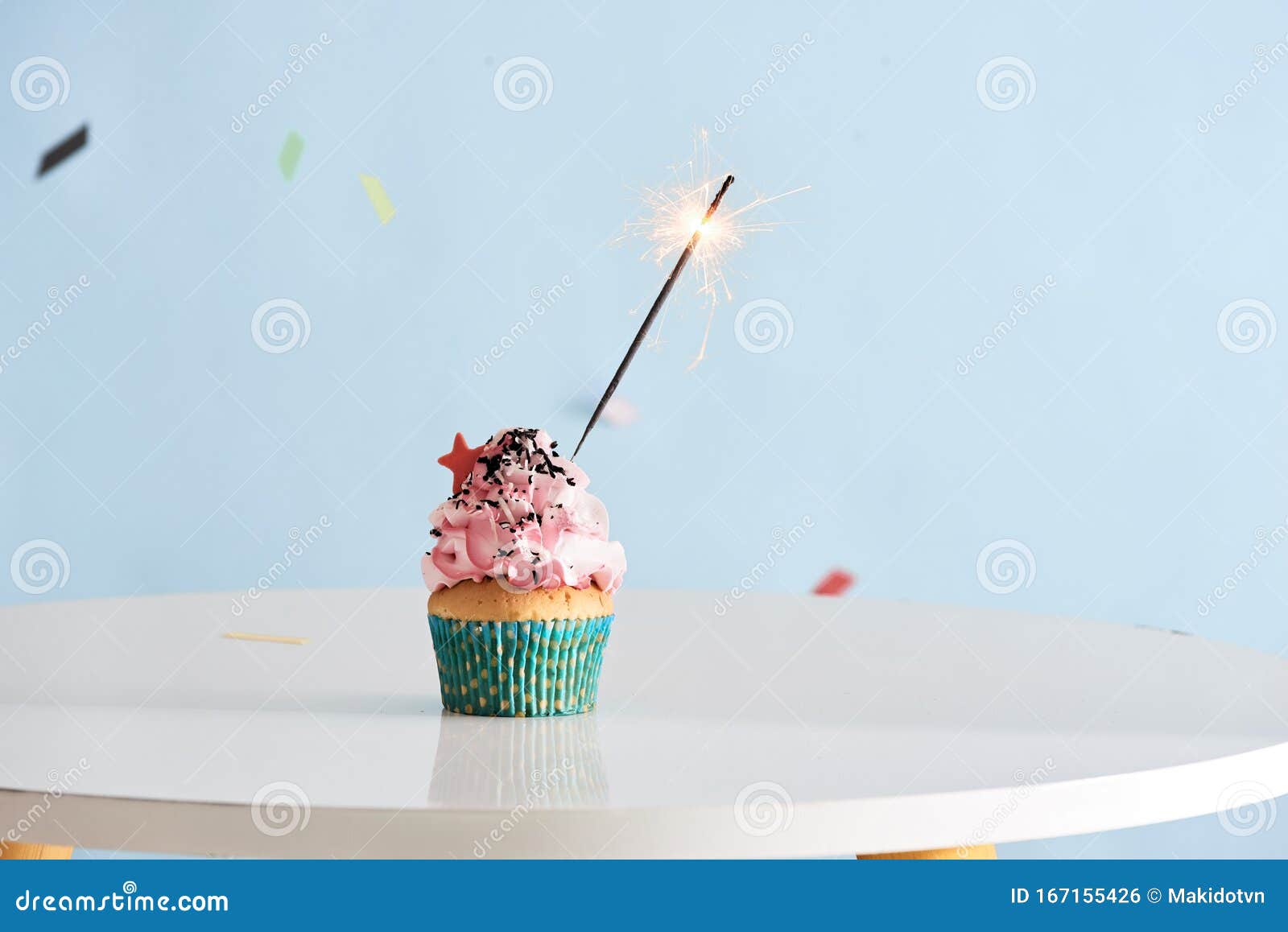 Single Sparkler on Cupcake Blue Wal Stock Photo - Image of pink, single ...