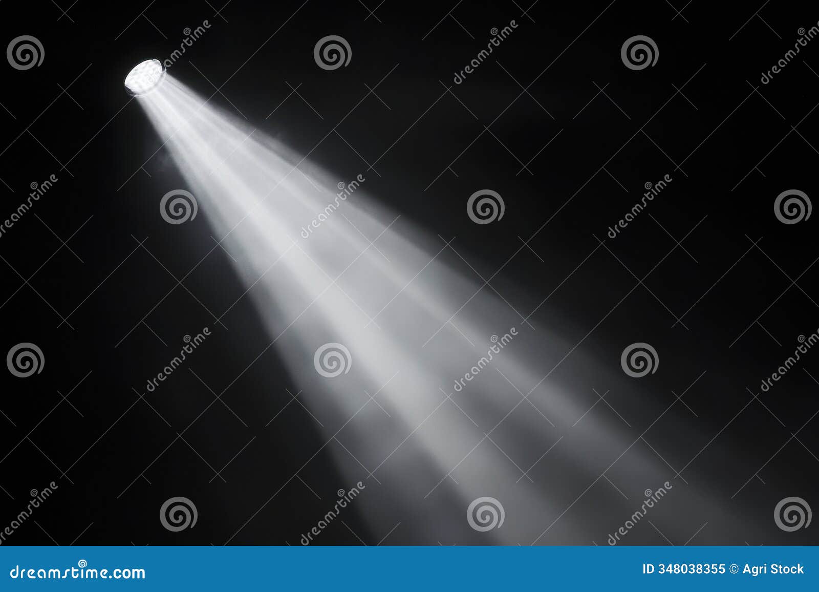 A Single Spotlight Illuminates a Dark Room with a Bright Beam of Light ...