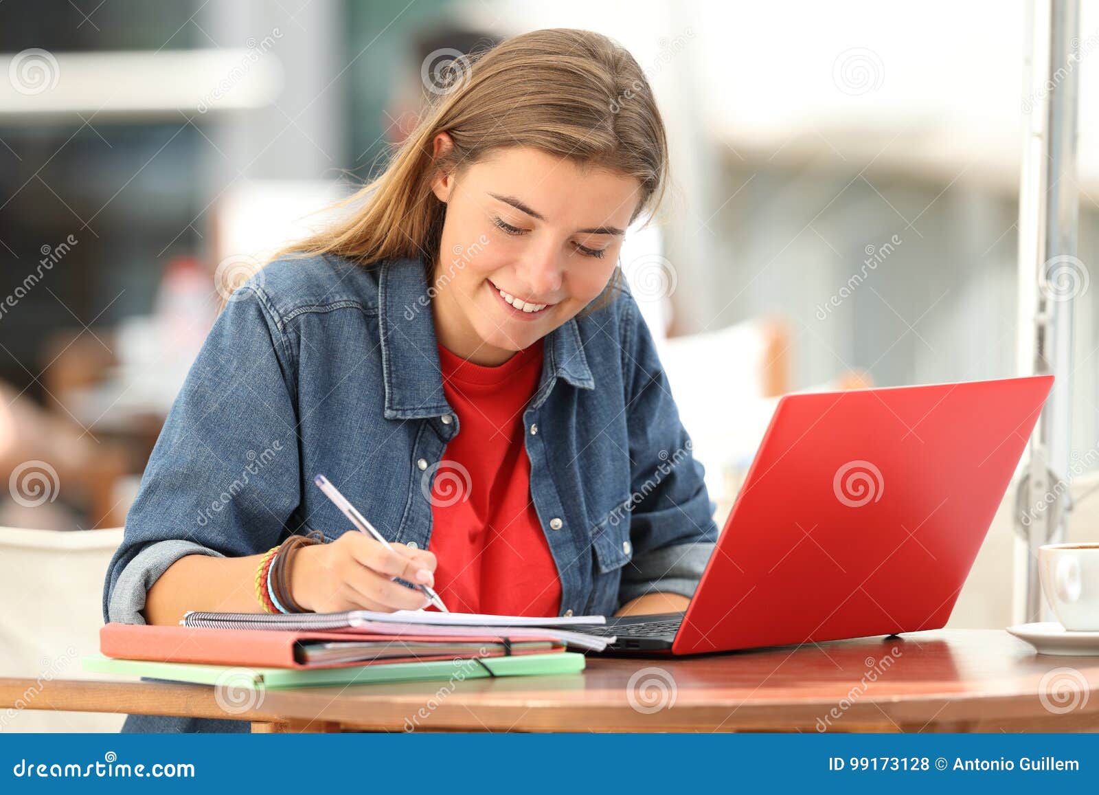 Student E-learning Taking Notes in a Bar Stock Photo - Image of ...