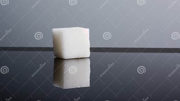 Single Sugar Cube on Reflective Surface Stock Image - Image of ...