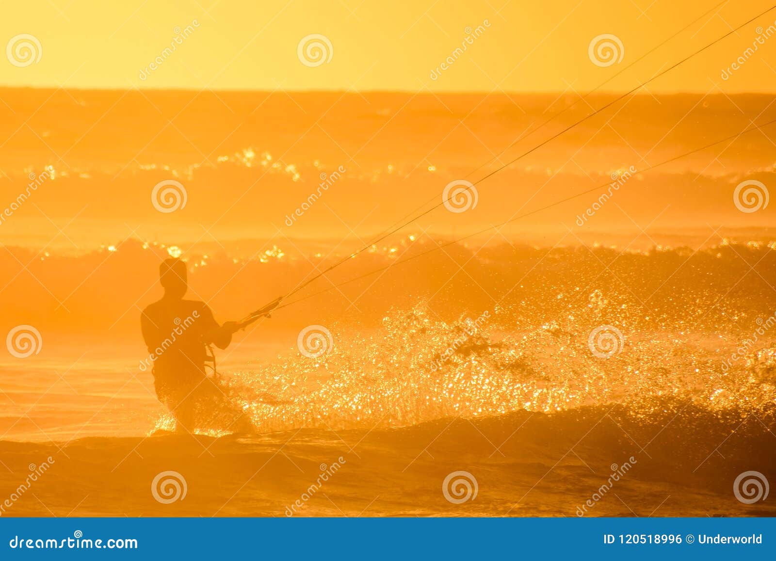 Surfer at Sunset on a Calm Ocean Stock Photo - Image of beach, ocean ...