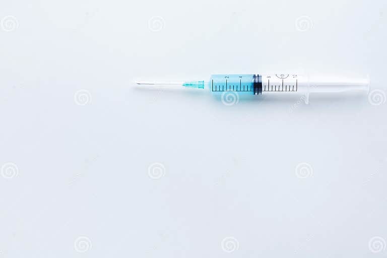 Single Syringe Filled with Light Blue Liquid Stock Image - Image of ...