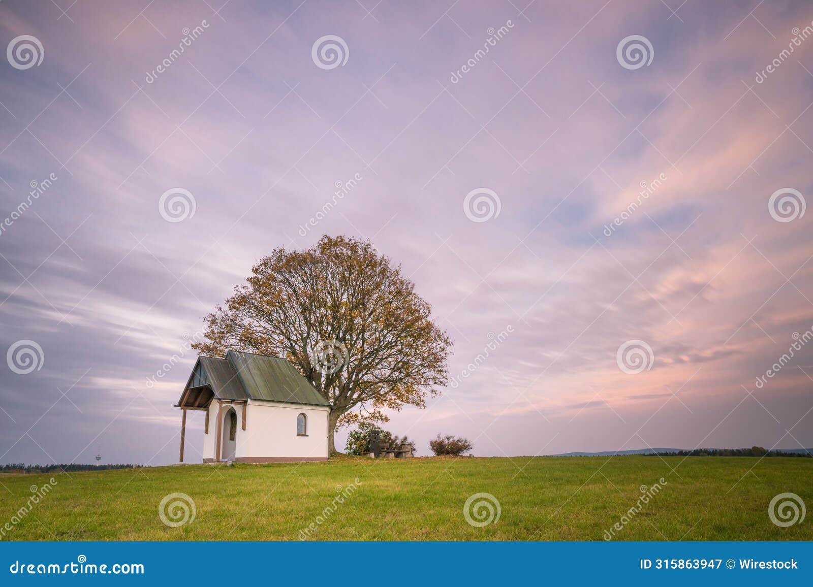 Single Tree in a Wide Field with a Chapel at Sunset Stock Image - Image ...