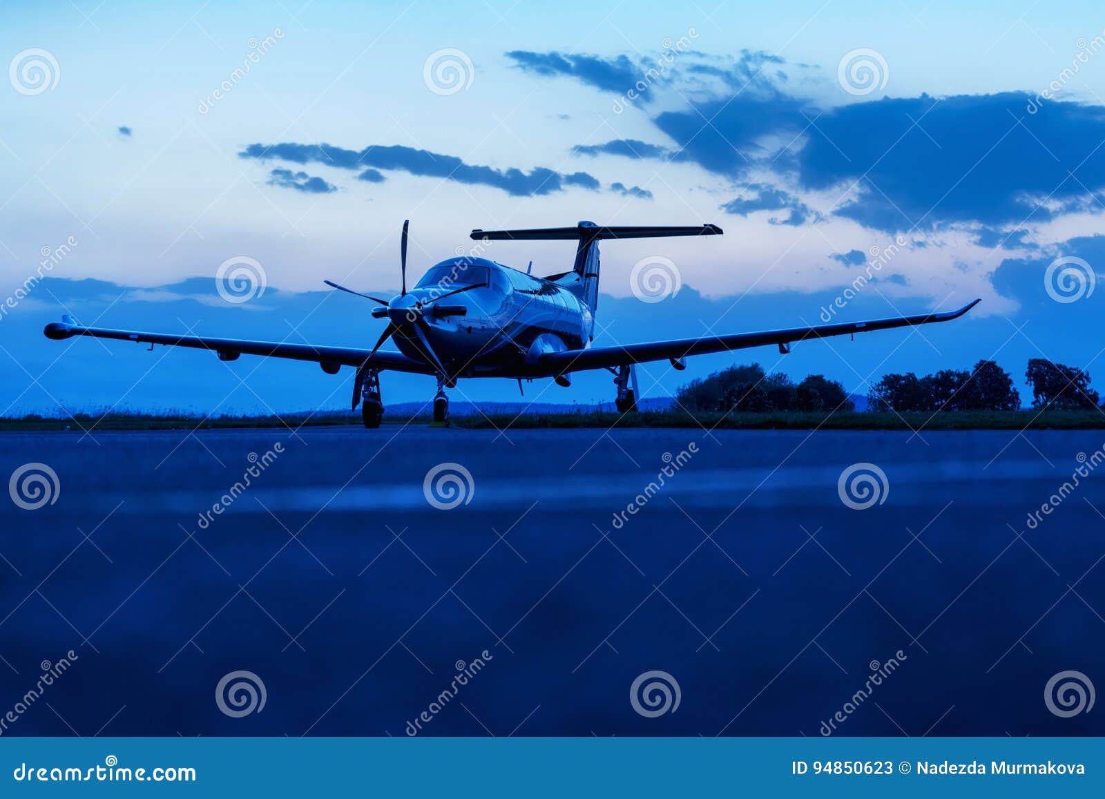Single Turboprop Aircraft on Evening Runway. Stock Image - Image of ...