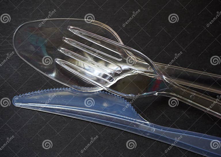 Single-use Plastic Cutlery on a Black Stock Image - Image of pollution ...