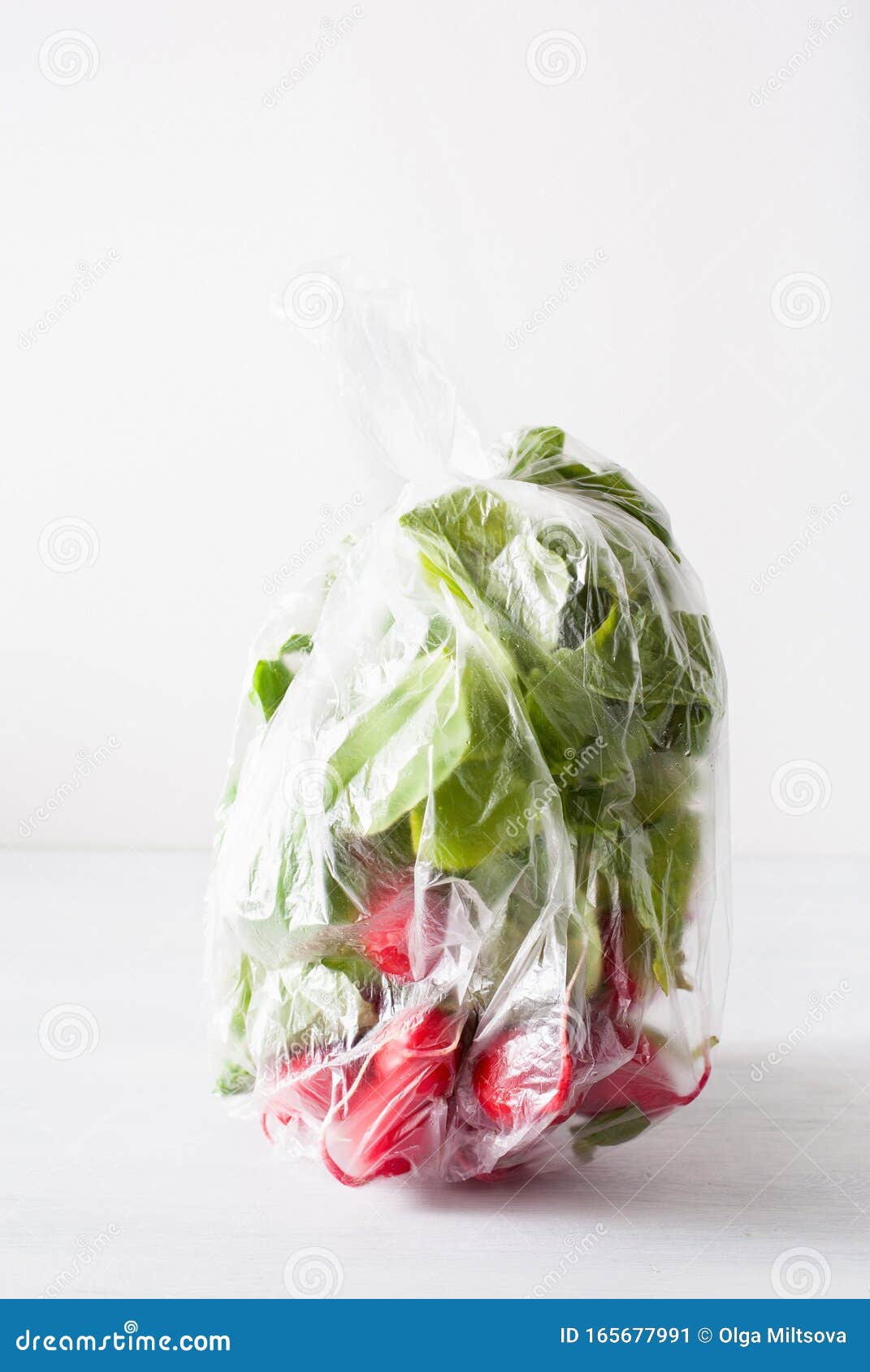 Single Use Plastic Packaging Issue. Radish Vegetable in Plastic Bag ...