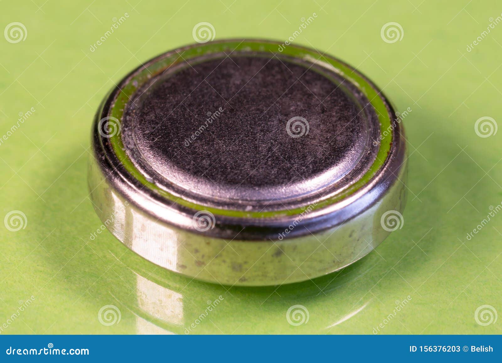 SIngle watch battery stock image. Image of charger, electric - 156376203