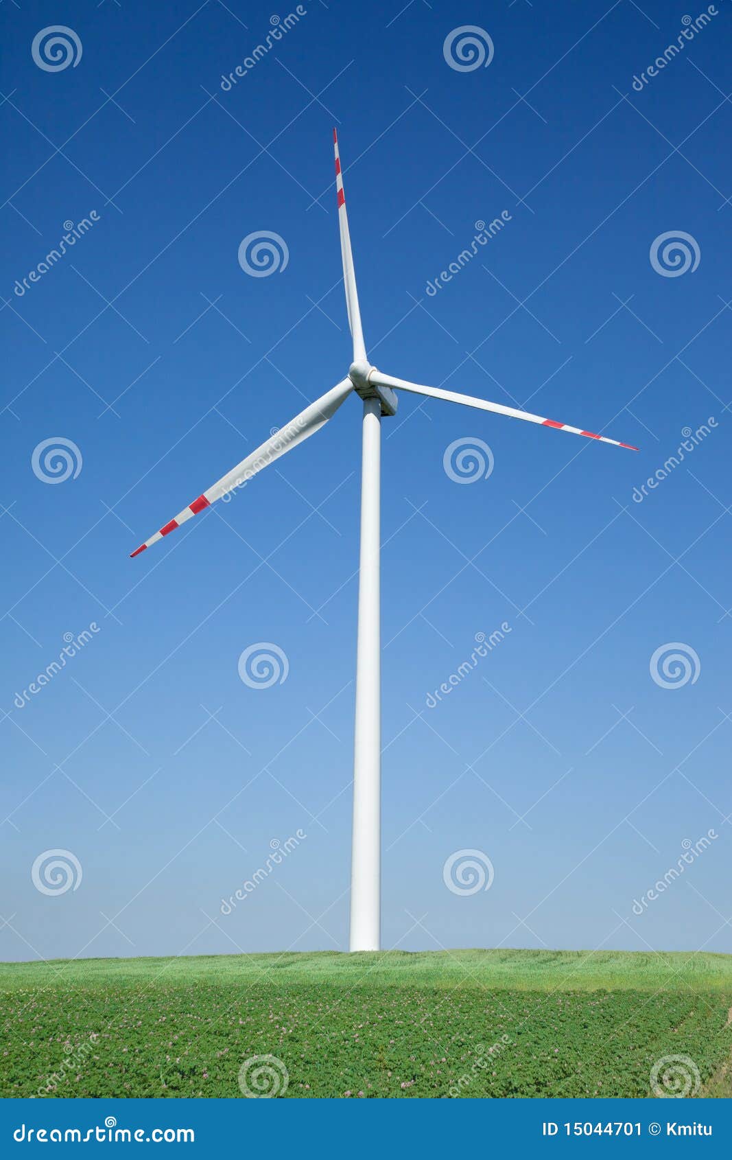 A Single Wind Turbine Towers Over The Ocean, Its Blades Spinning ...