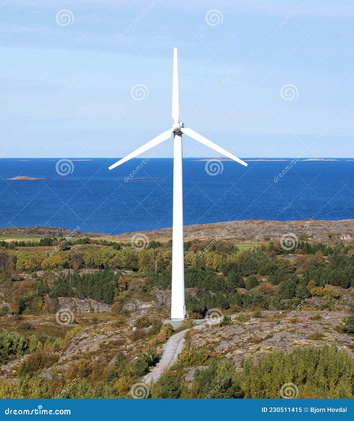 Single Windmill with Ocean and Sky in the Background. Stock Image ...