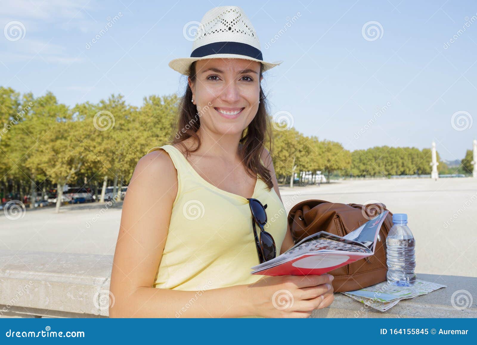 Single Woman with Tourist Guide Book Stock Image - Image of background ...