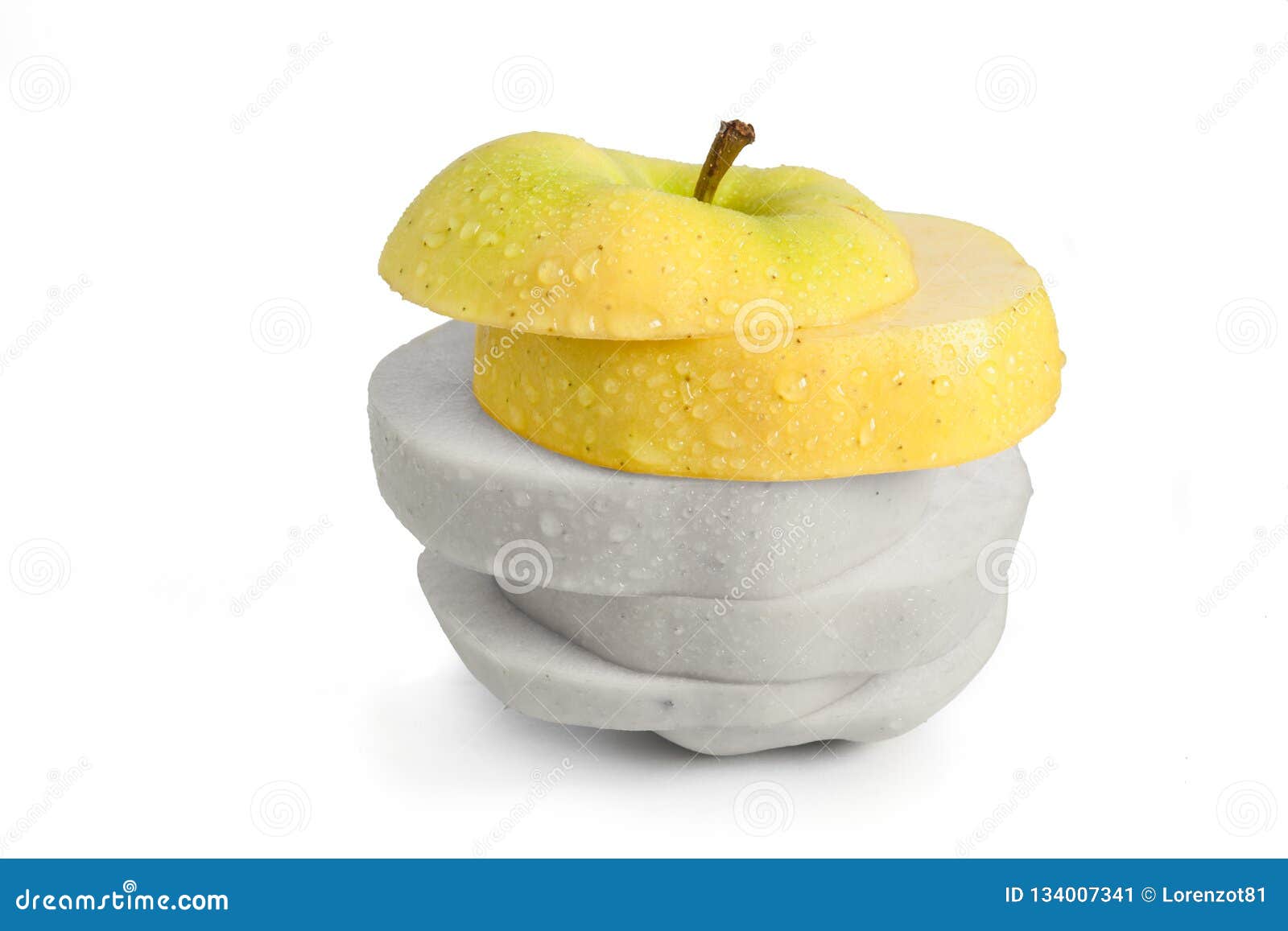 Single Yellow Apple Cut into Diagonal Slices Stock Image - Image of ...