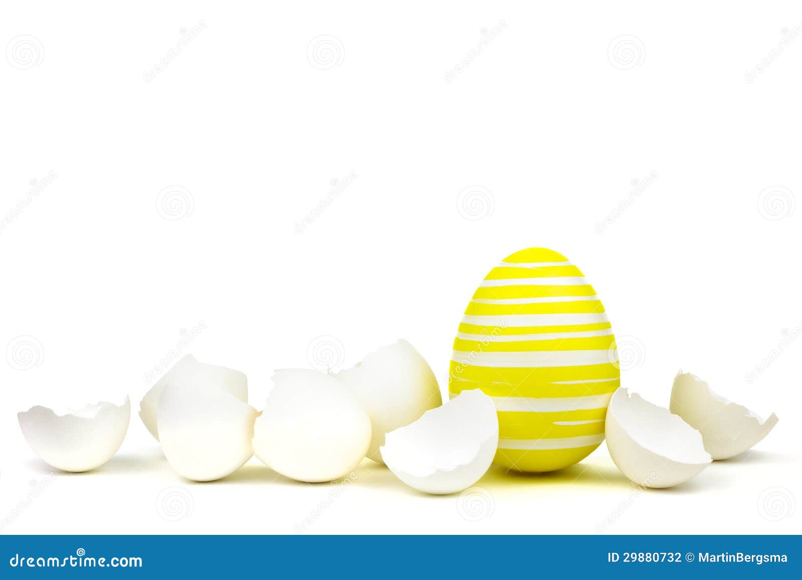 Single Yellow Easter Egg between Egg Shells on White Stock Photo ...