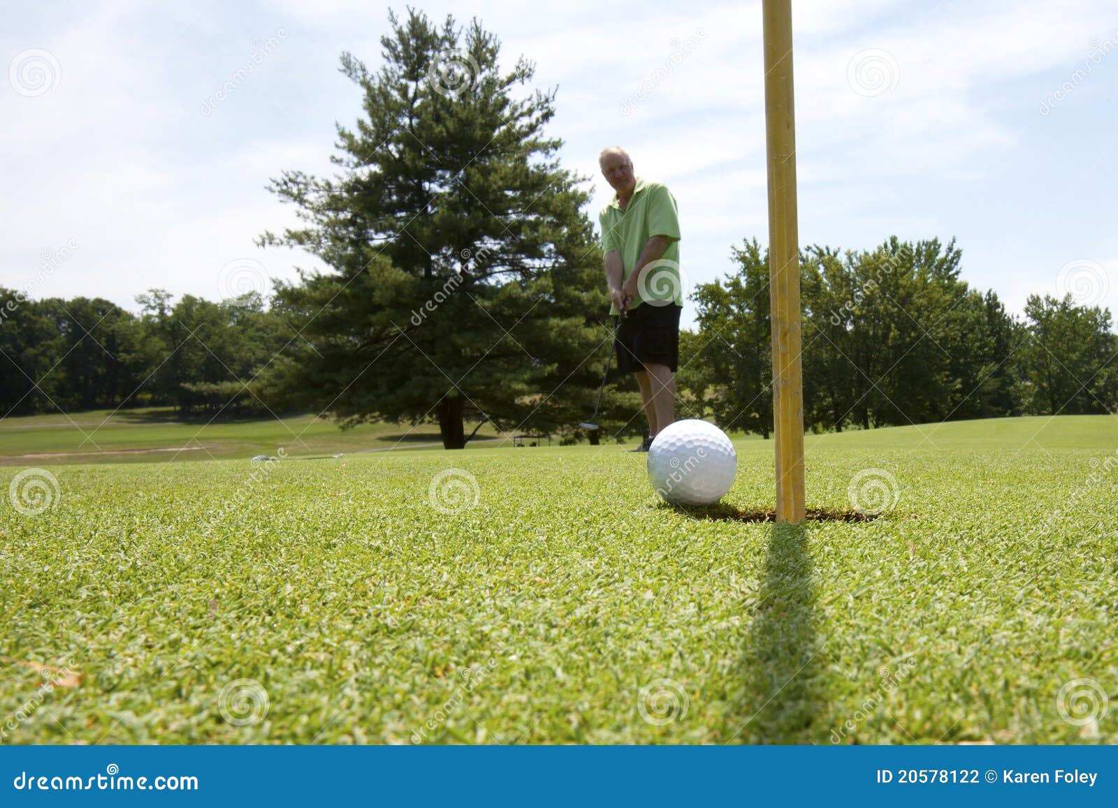 Sinking the Putt stock photo. Image of outdoors, falling - 20578122