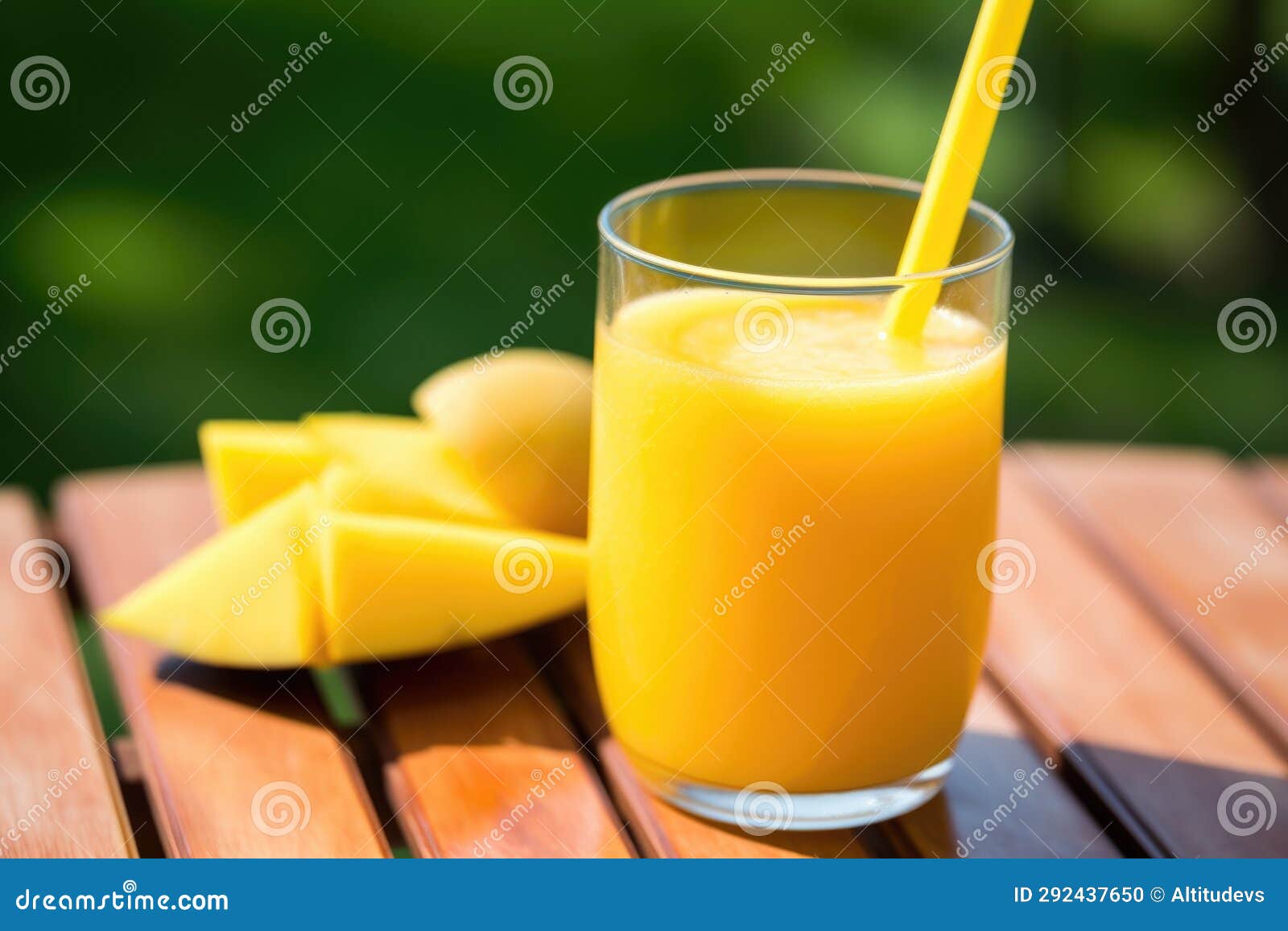 A Sip of Mango Juice Taken from Drinking Straw Stock Photo - Image of ...