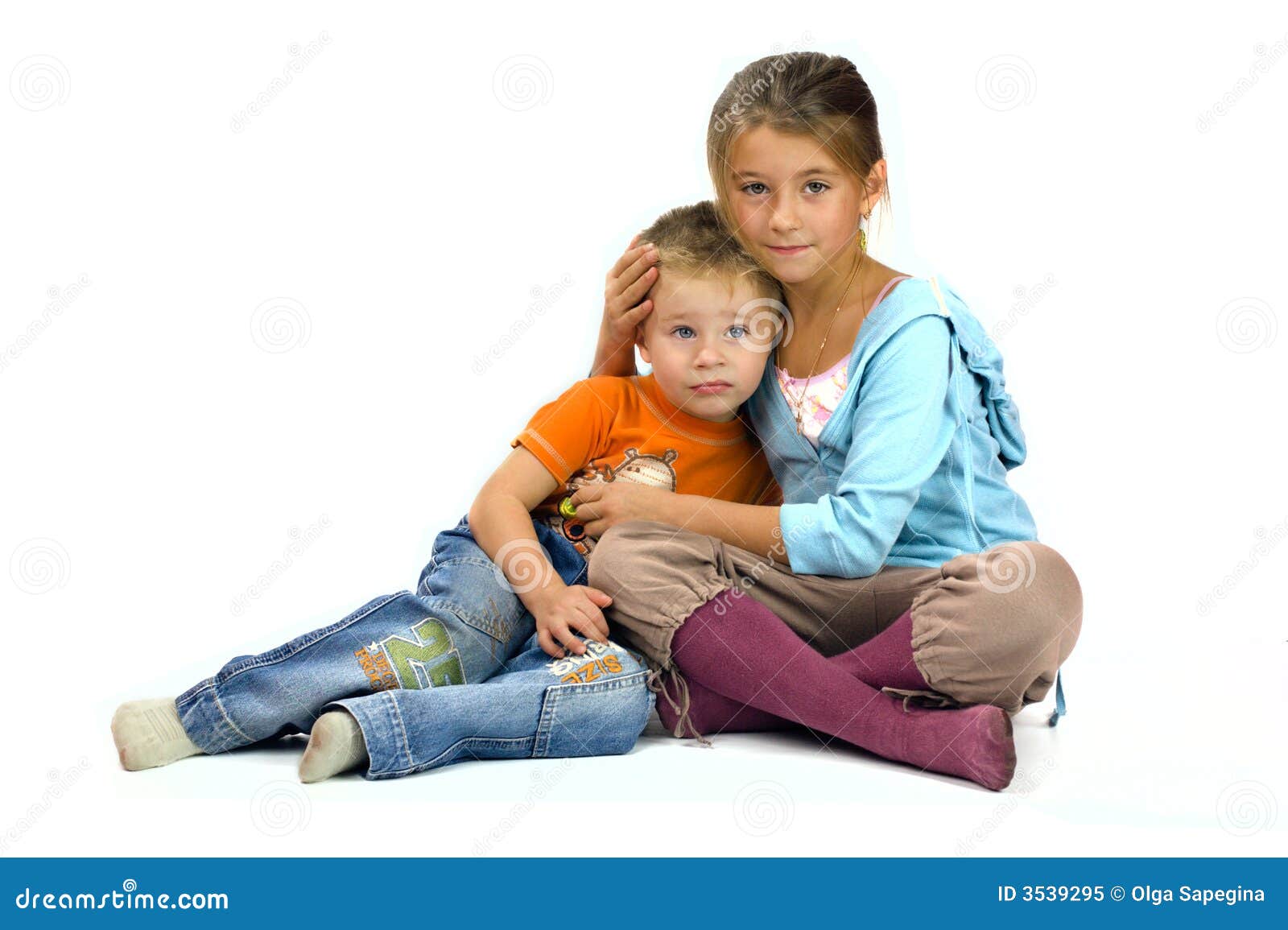 Sister helps her brother stock image. Image of intent - 3539295