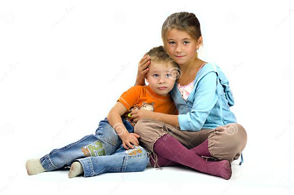 Sister helps her brother stock image. Image of intent - 3539295