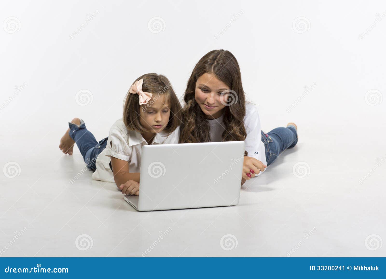Sister play on computer stock image. Image of exploration - 33200241