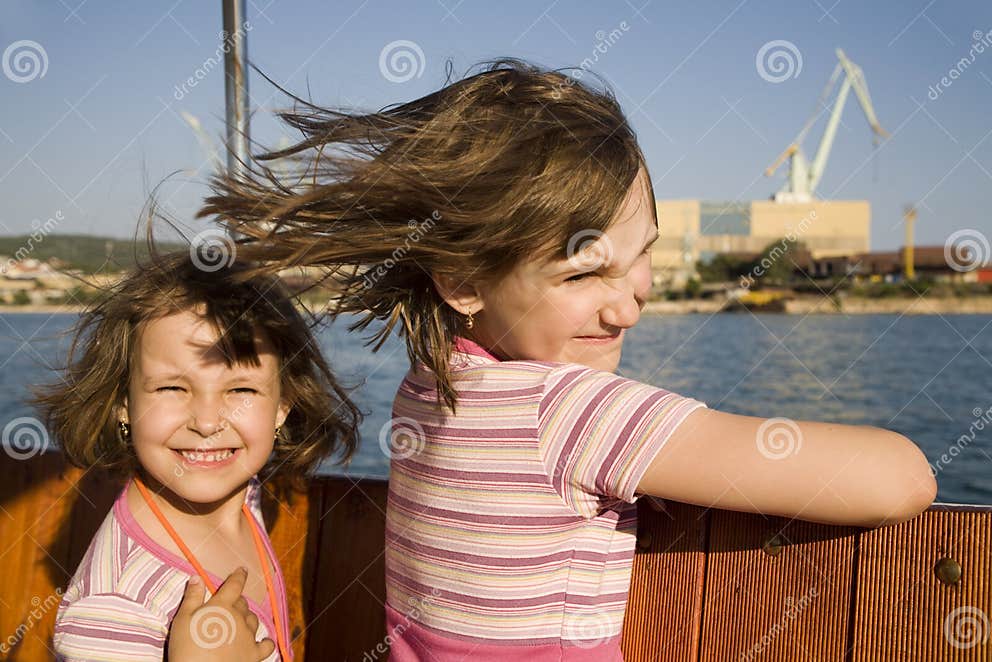 Sisters on the Boot in Holiday Stock Image - Image of friendship ...